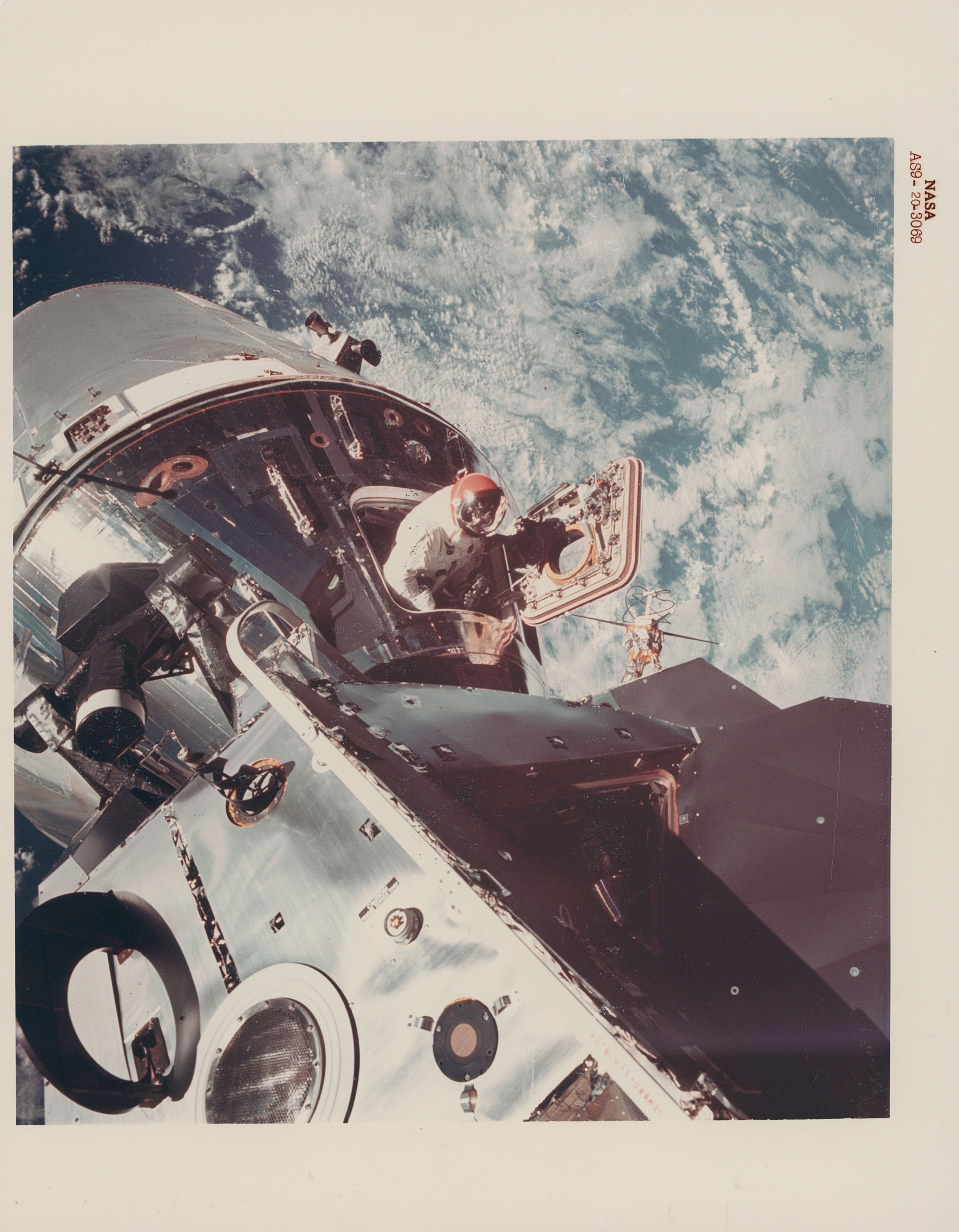 David Scott taking photographs from Gumdrop; Russell Schweickart taking ...