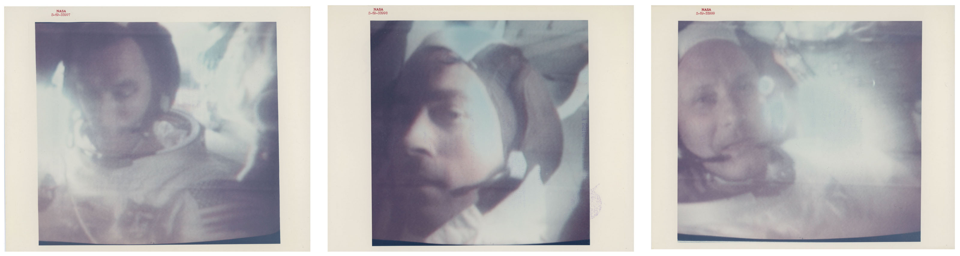 Eugene Cernan, John Young and Thomas Stafford weightless in their ...