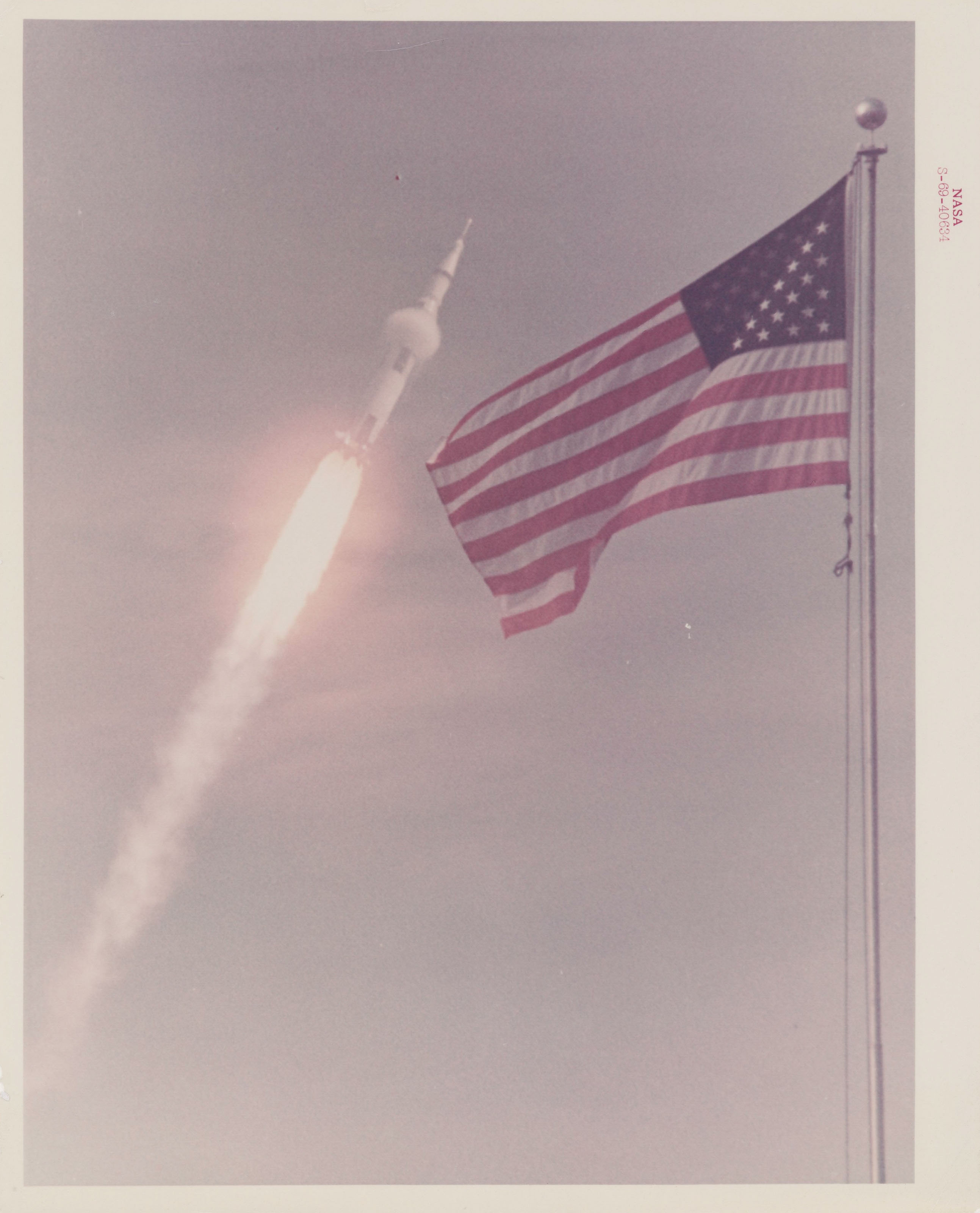 Photomontage of the Saturn V rocket and the US flag; views of NASA ...