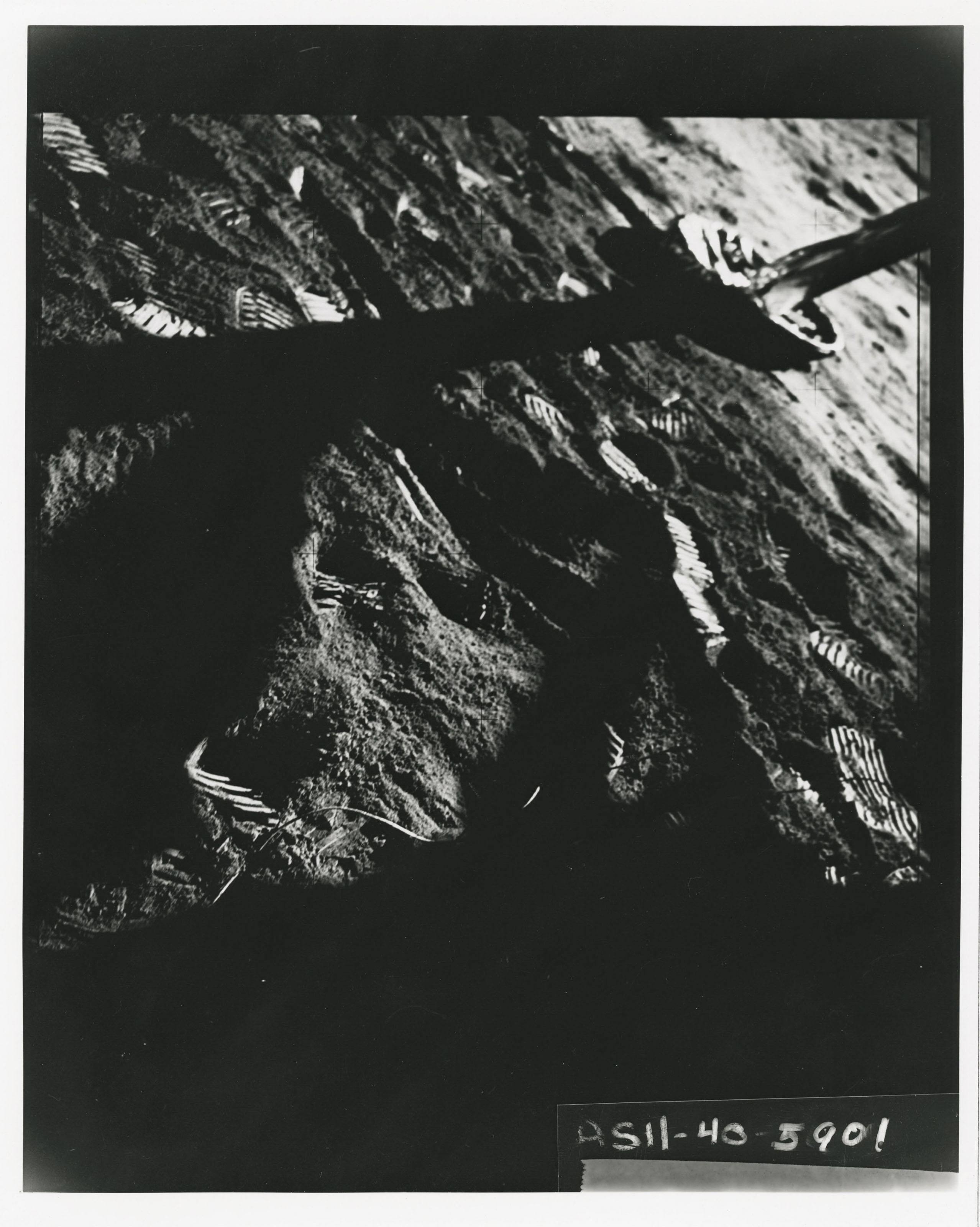 Footprints on the Moon; close-up of the lunar surface under Eagle; the ...