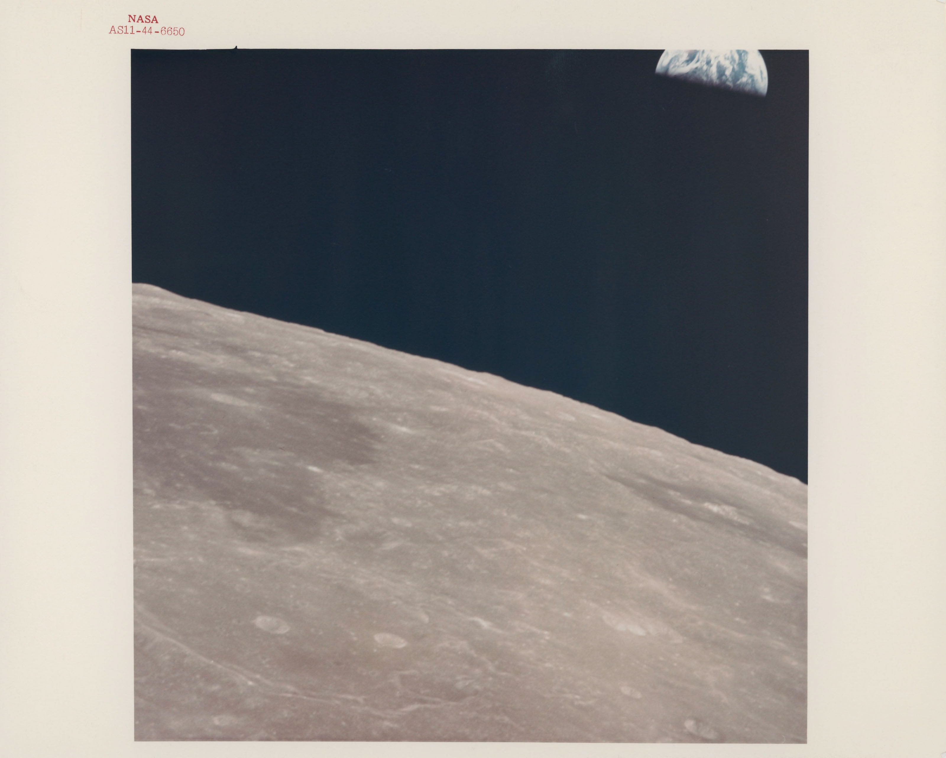Earthrise, taken after transEarth injection, July 16-24, 1969, N ...