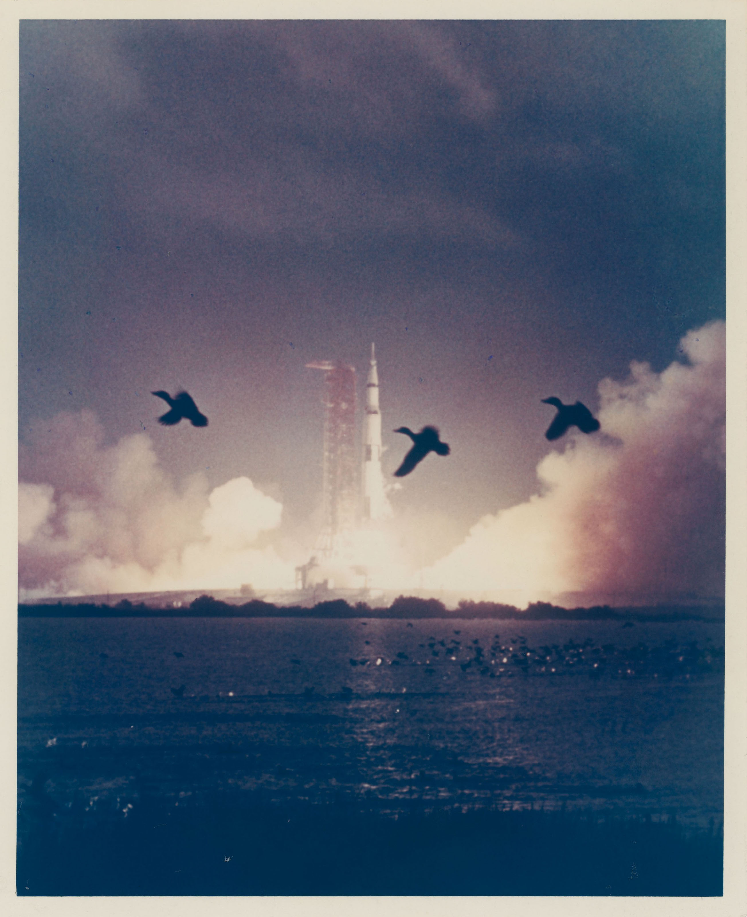 Liftoff; landing site; EVA 2 traverse; the Saturn V at night; Alan Bean ...