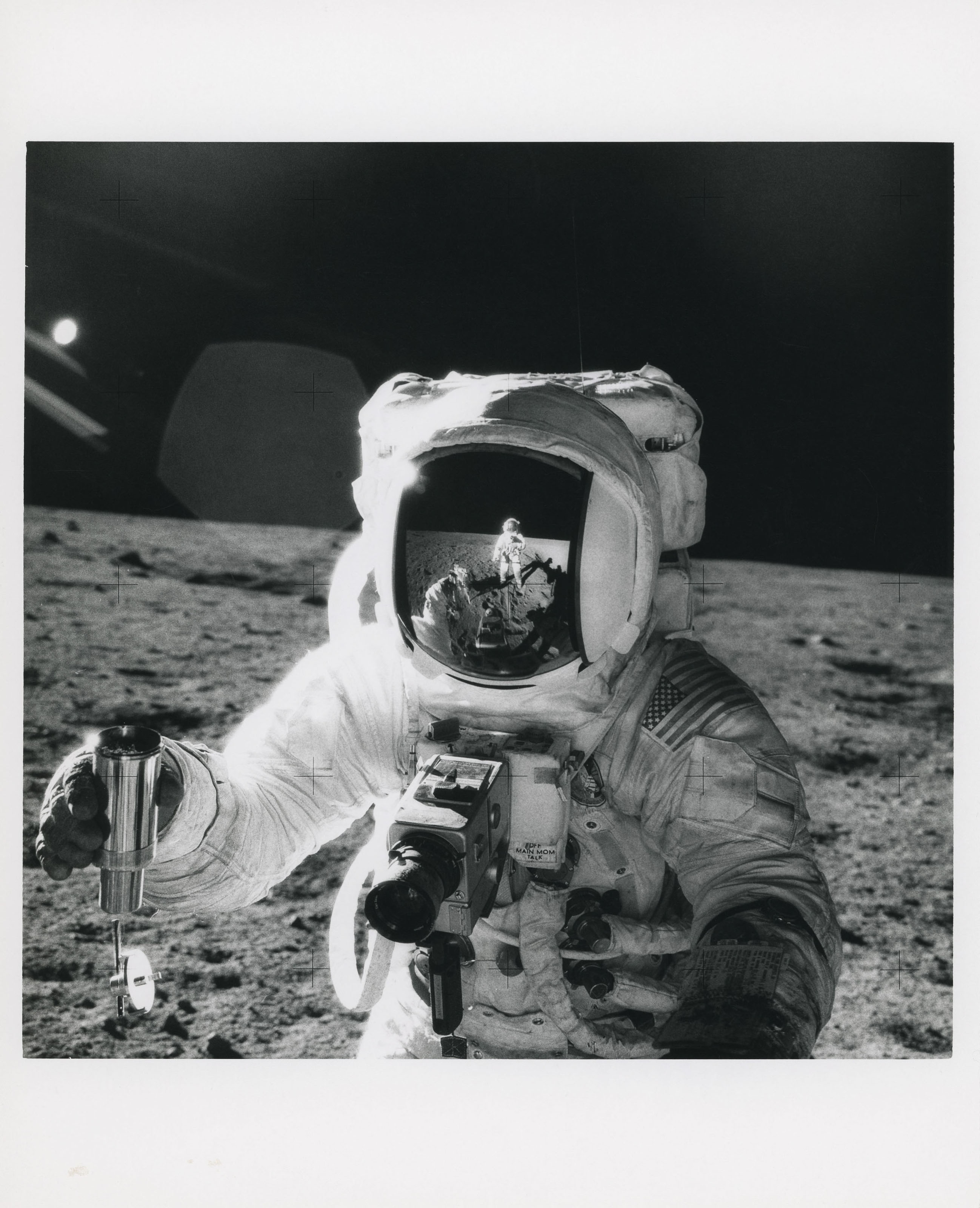 Alan Bean with the reflection of the photographer in his visor ...