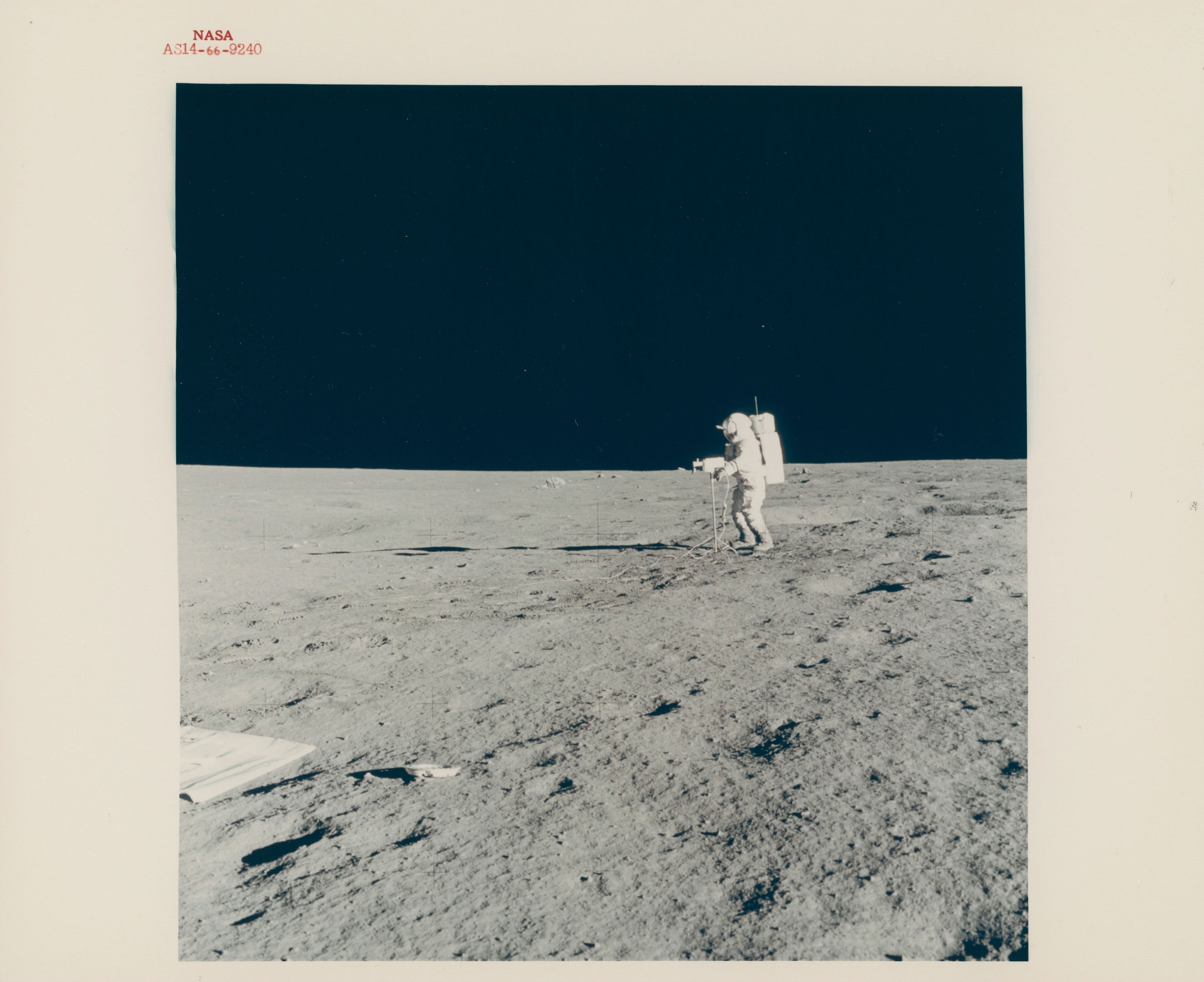 Edgar Mitchell operating the live color TV camera; the LM Antares and ...