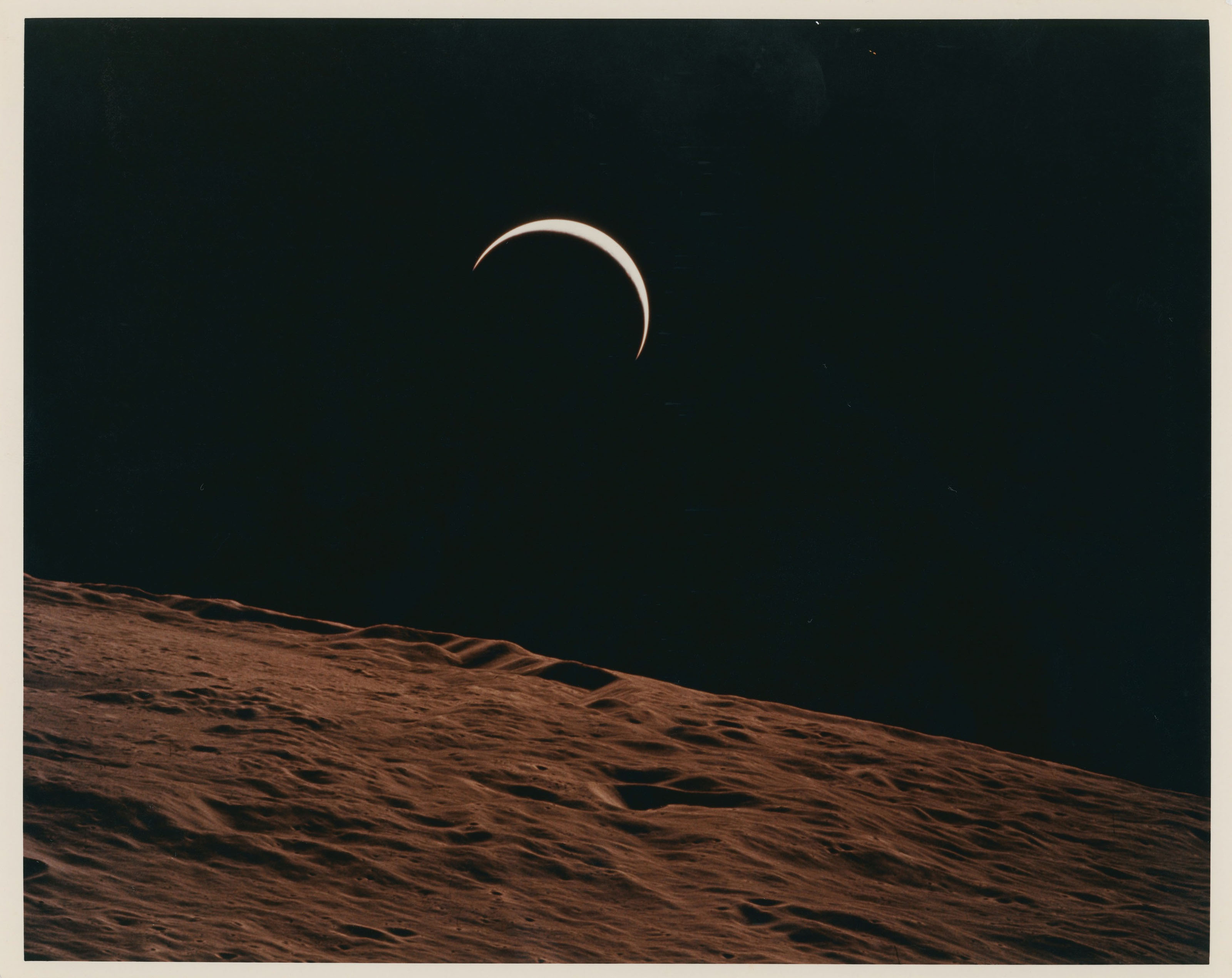 Crescent Earth rising beyond the Moon’s barren horizon, July 26-August ...