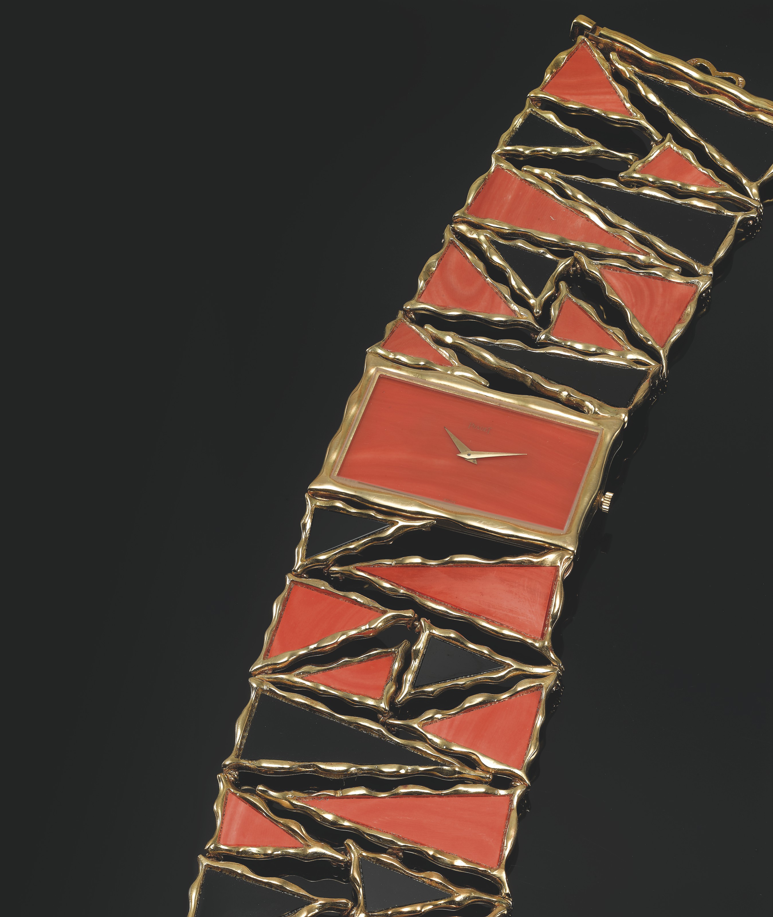 PIAGET, GOLD, CORAL AND ONYX-SET BRACELET WATCH, MOVEMENT NO. 218'129 ...