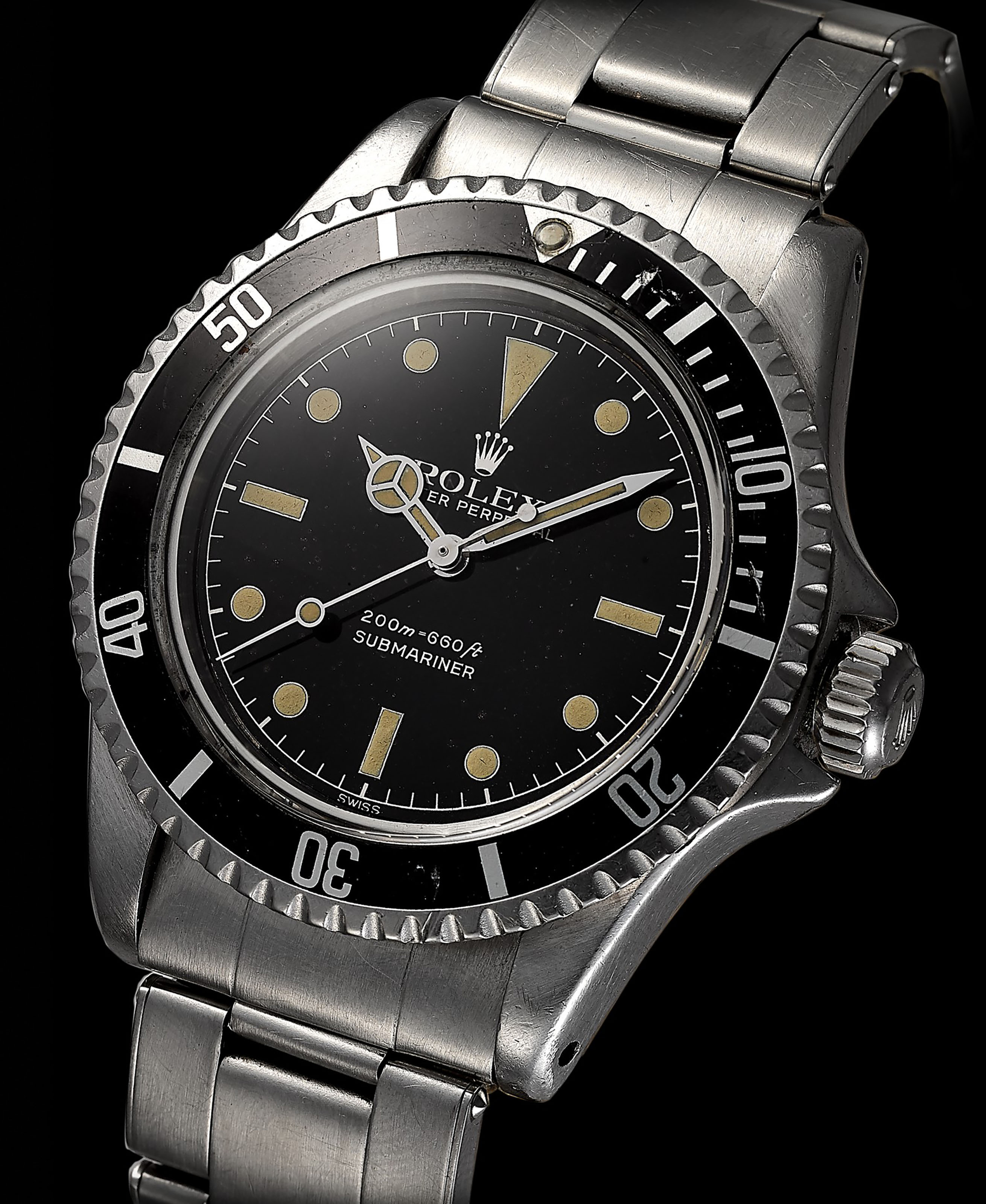 ROLEX, STEEL SUBMARINER WITH POINTED CROWN GUARDS AND GILT GLOSSY DIAL ...