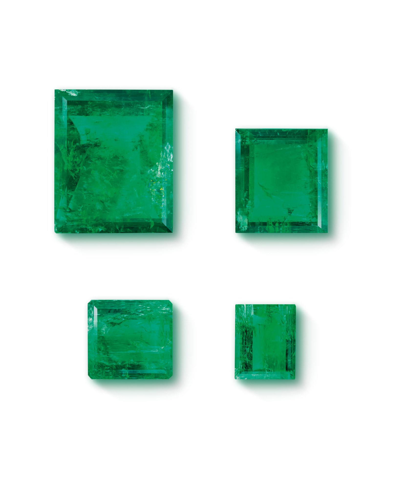 FOUR UNMOUNTED EMERALDS | Christie's