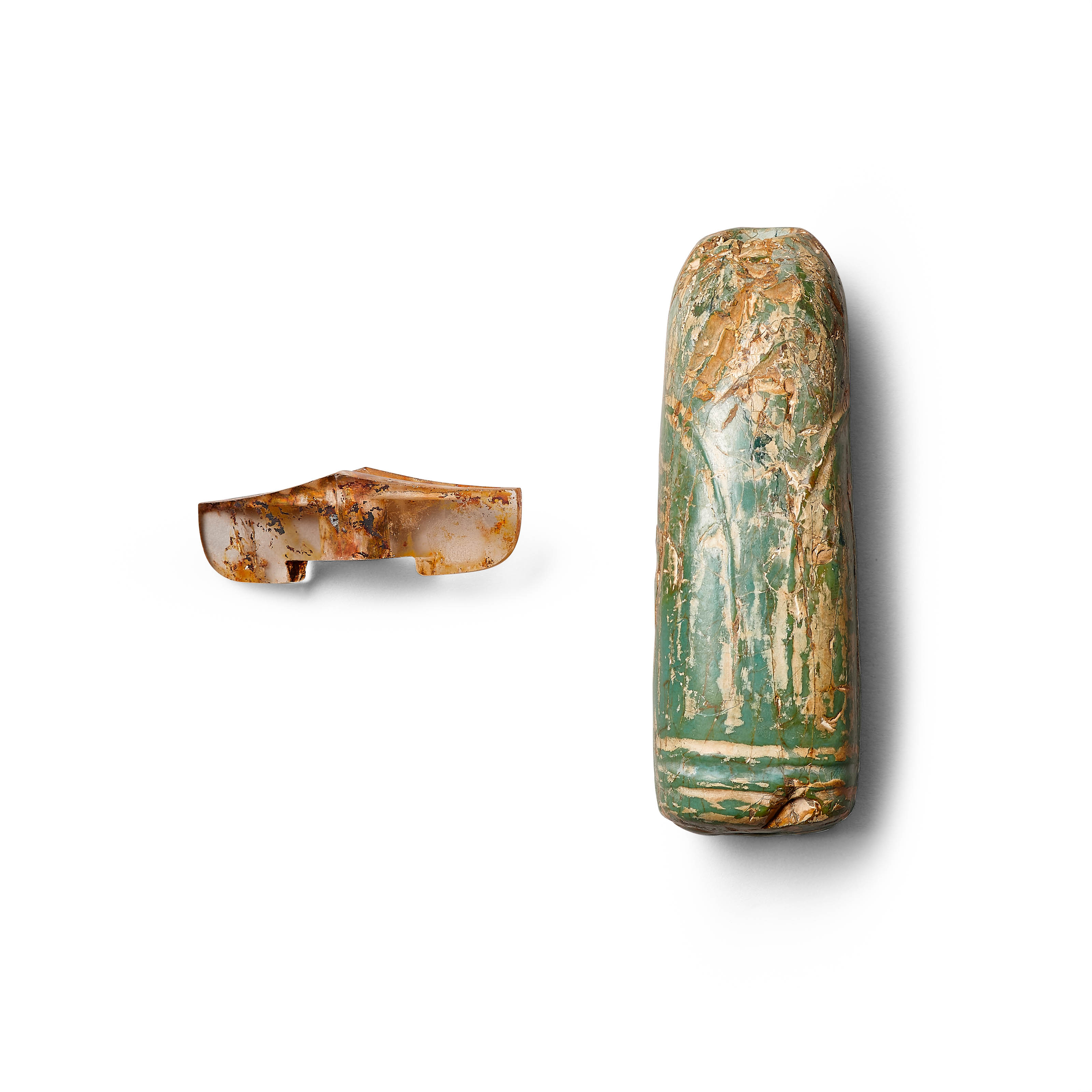 A CARVED TURQUOISE CICADA AND A ROCK CRYSTAL SWORD GUARD, TURQUOISE ...