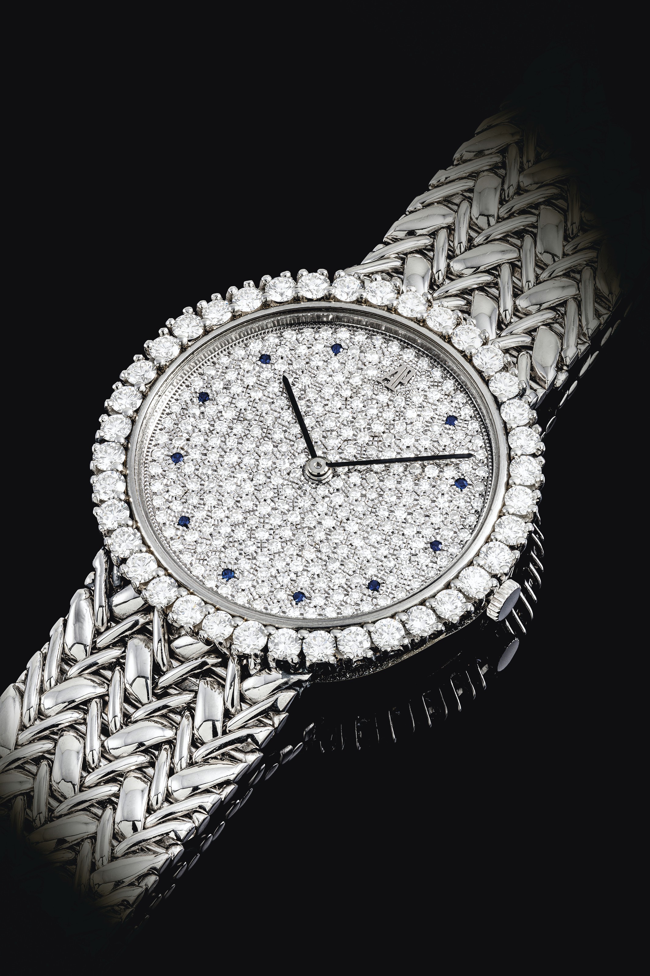 AUDEMARS PIGUET. A PLATINUM, DIAMOND AND SAPPHIRE-SET BRACELET WATCH