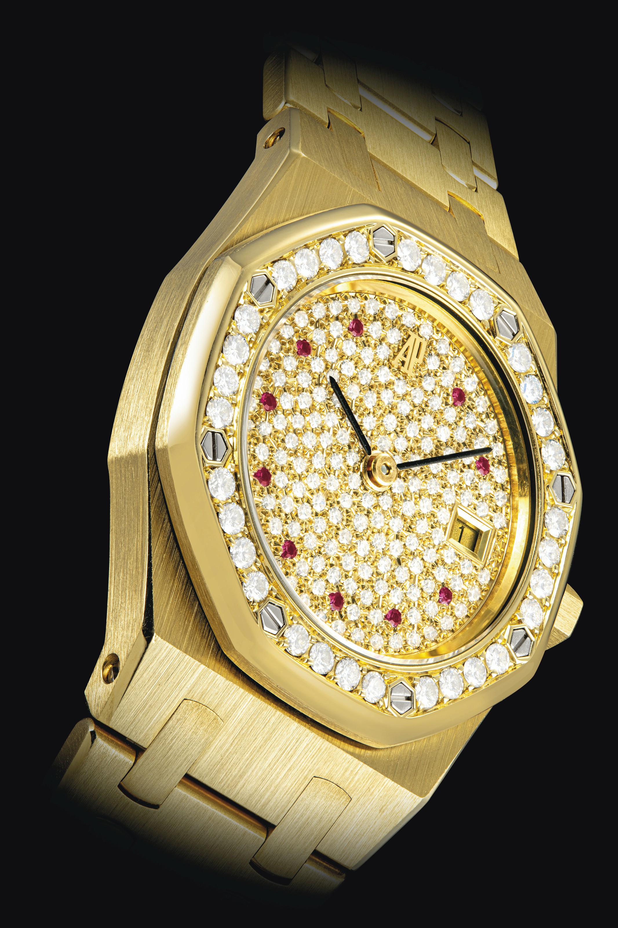 AUDEMARS PIGUET. A RARE 18K GOLD, DIAMOND AND RUBY-SET MID-SIZE ...