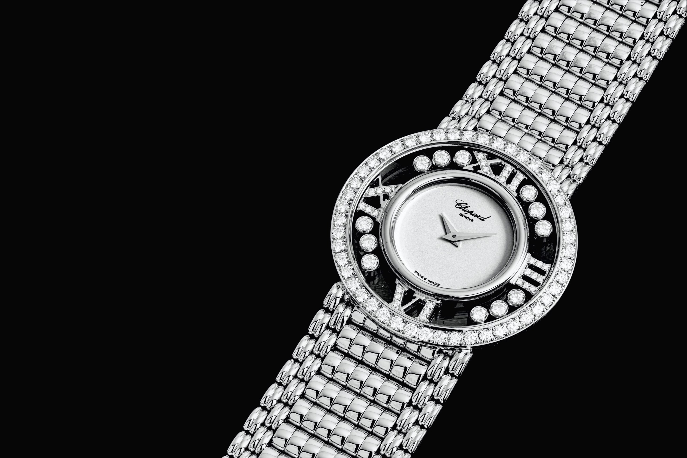 CHOPARD. AN 18K WHITE GOLD AND DIAMOND-SET BRACELET WATCH, SIGNED ...