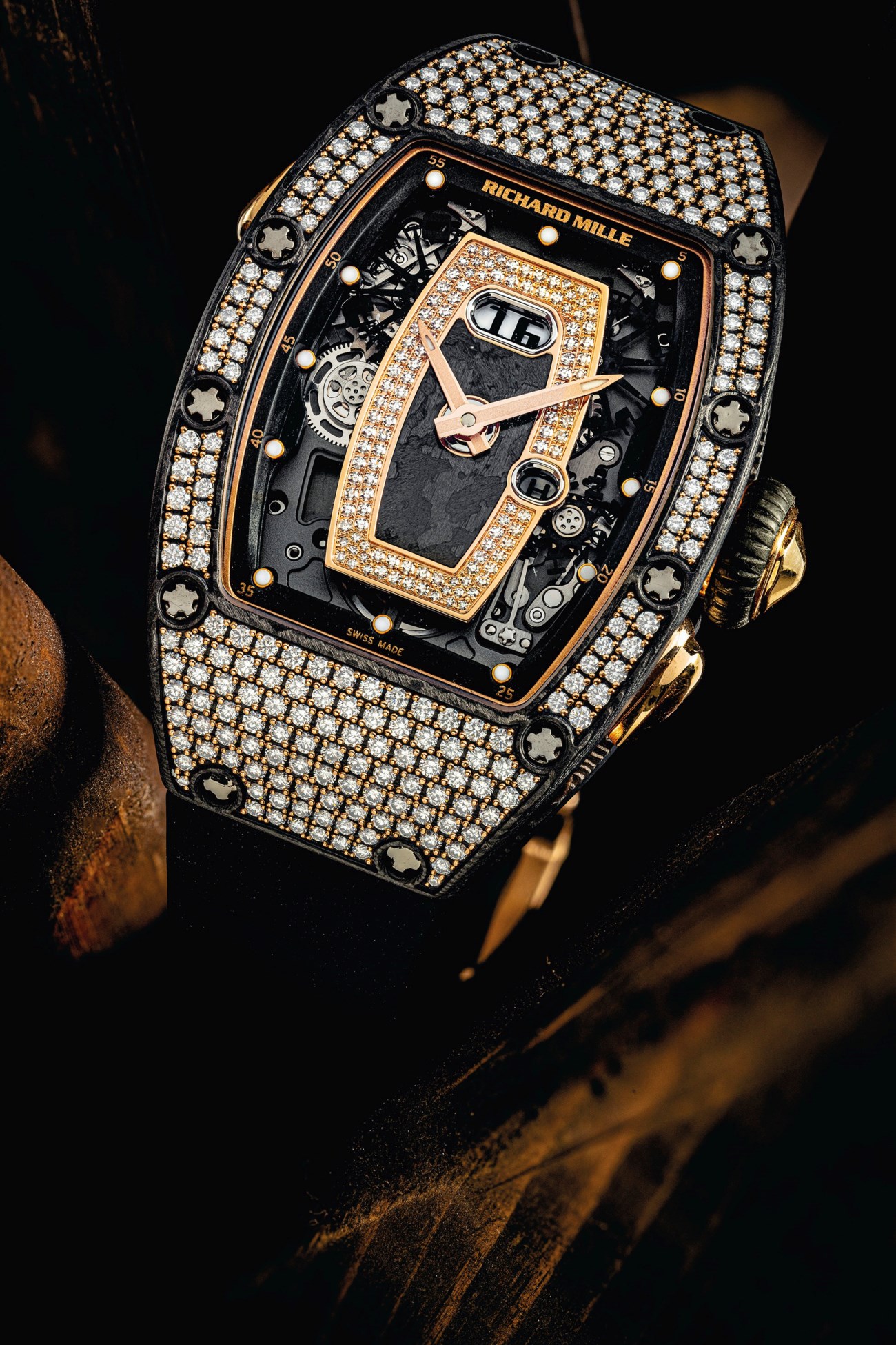 RICHARD MILLE. A LADY'S RARE AND ATTRACTIVE TPT CARBON, 18K PINK GOLD ...