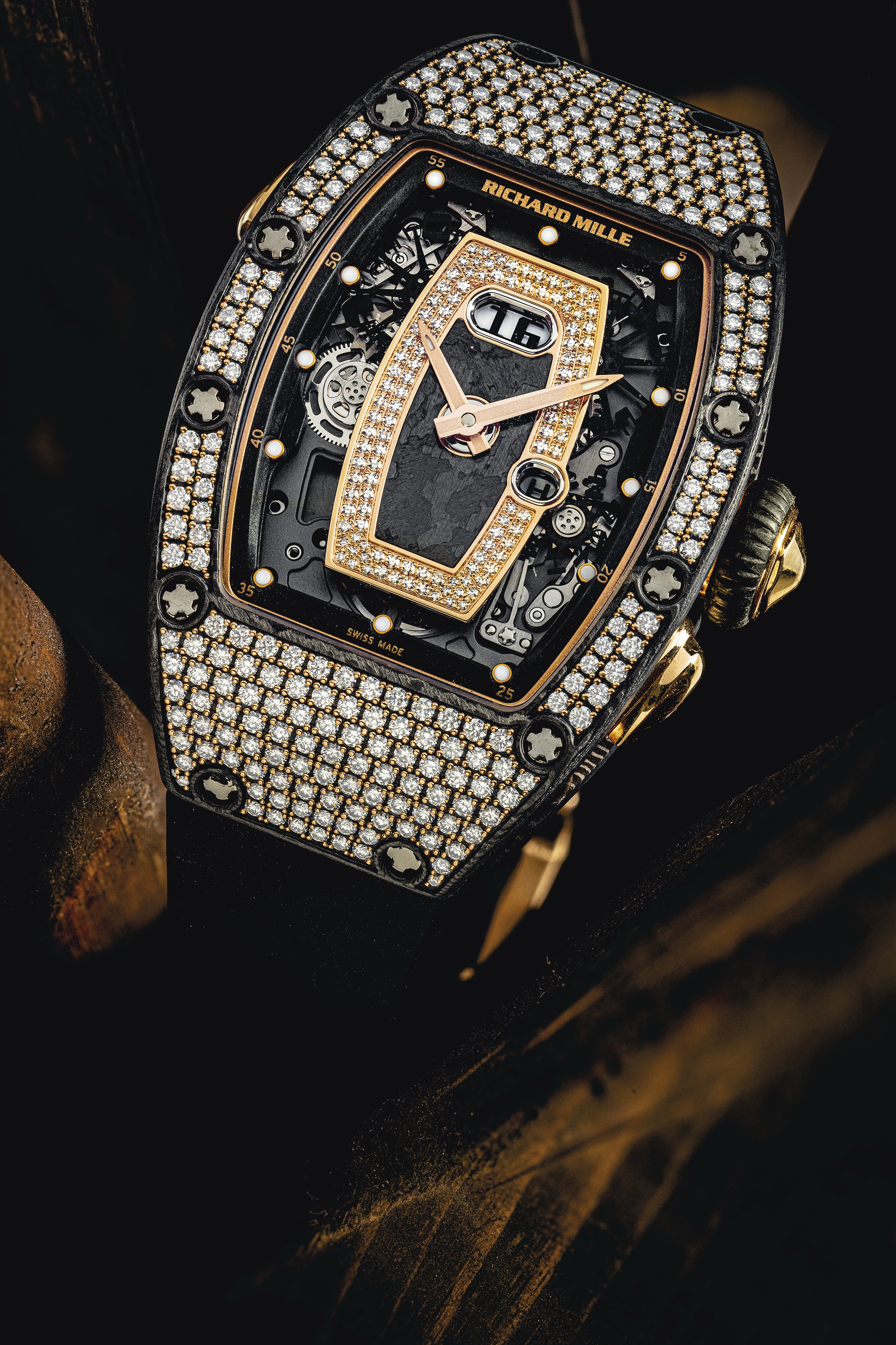RICHARD MILLE. A LADY'S RARE AND ATTRACTIVE TPT CARBON, 18K PINK GOLD ...