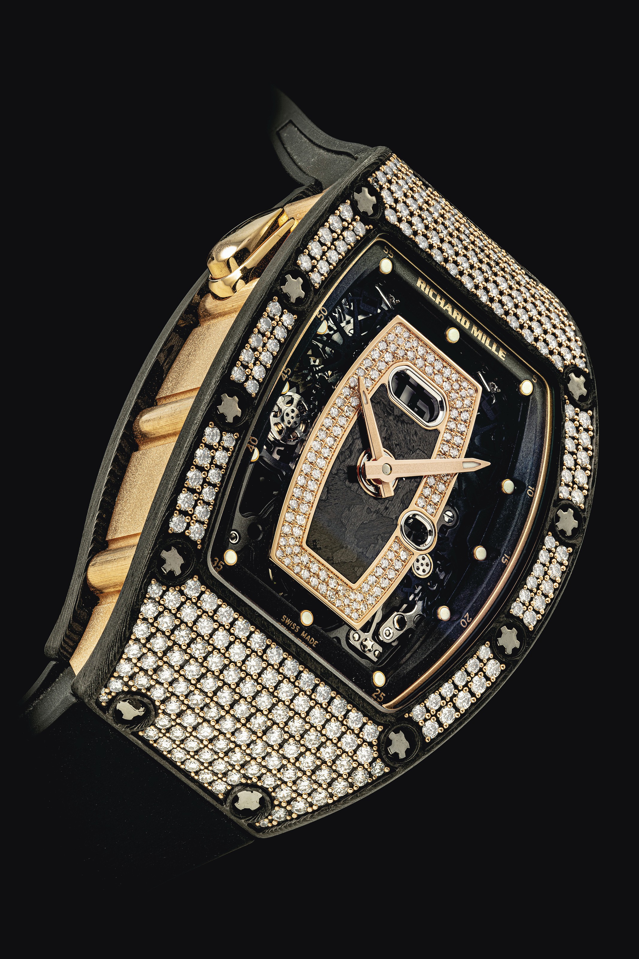 RICHARD MILLE. A LADY'S RARE AND ATTRACTIVE TPT CARBON, 18K PINK GOLD ...