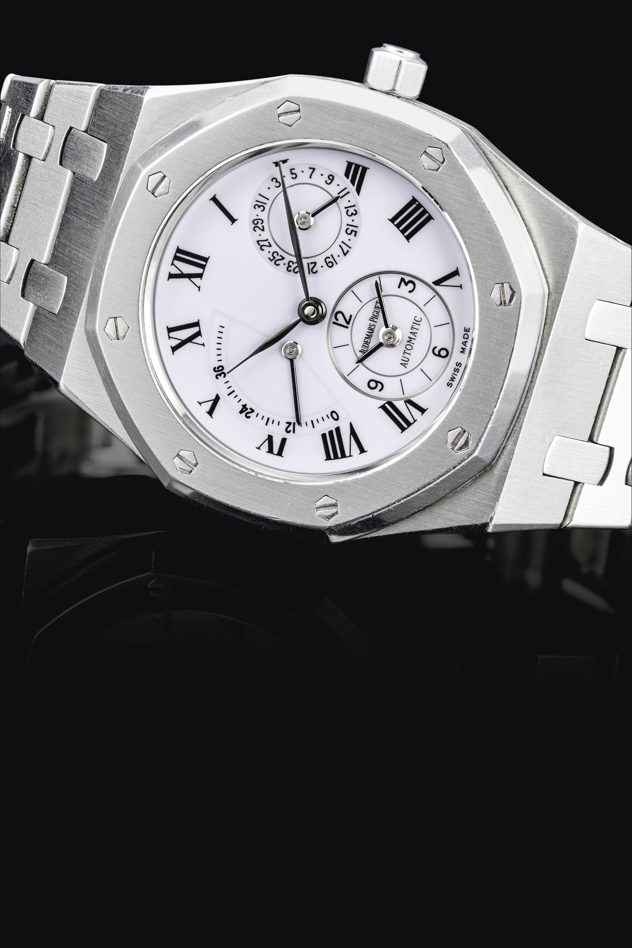 AUDEMARS PIGUET. A RARE STAINLESS STEEL AUTOMATIC DUAL TIME WRISTWATCH ...