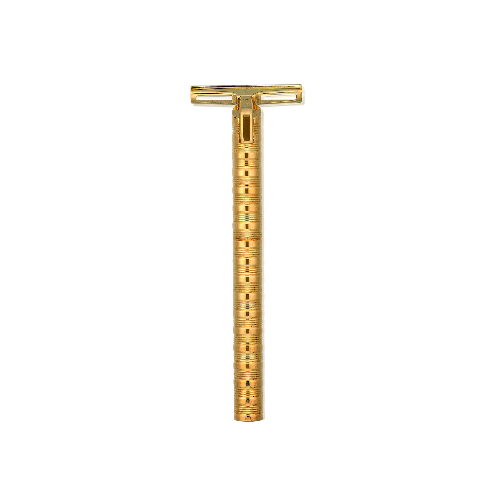 YELLOW GOLD RAZOR, | Christie’s
