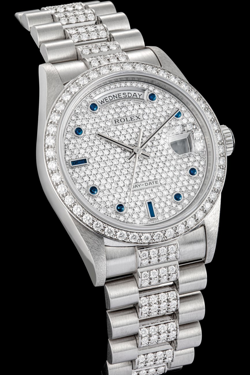 ROLEX. A PLATINUM, SAPPHIRE AND DIAMOND-SET WRISTWATCH WITH SWEEP ...