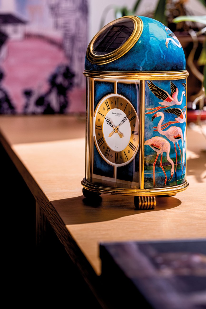 PATEK PHILIPPE. A UNIQUE GILT BRASS SOLAR POWERED DOME CLOCK WITH ...