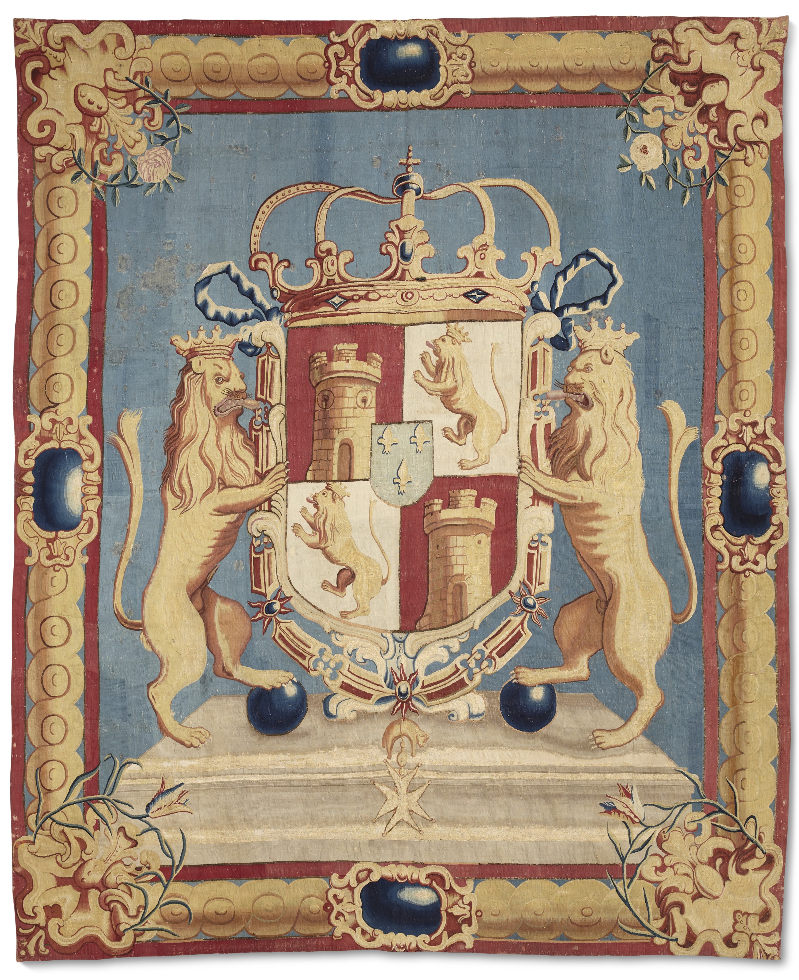 A SPANISH ARMORIAL TAPESTRY, ATTRIBUTED TO THE REAL FABRICA DE TAPICES ...