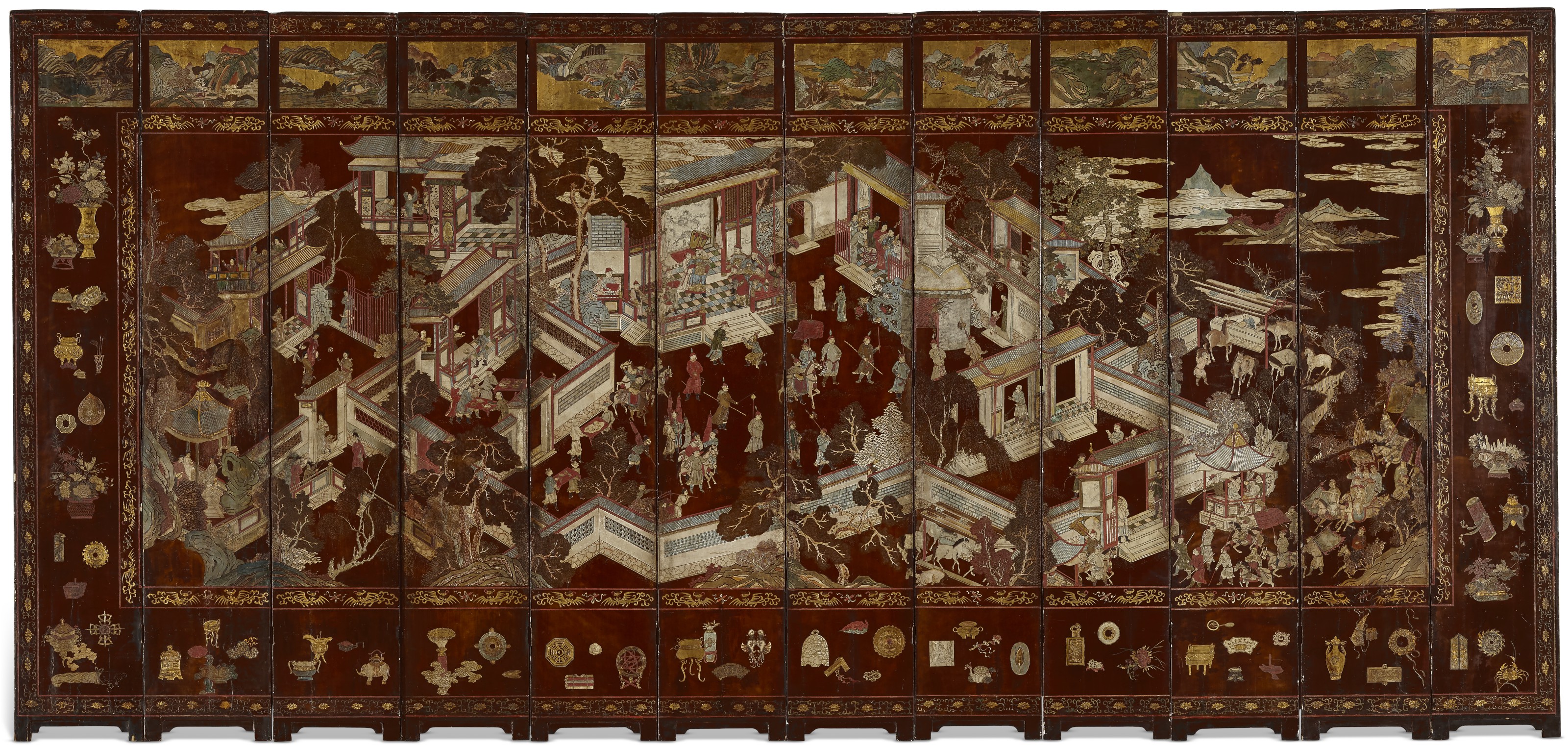 A CHINESE TWELVE-PANEL COROMANDEL LACQUER SCREEN, EARLY 18TH CENTURY ...