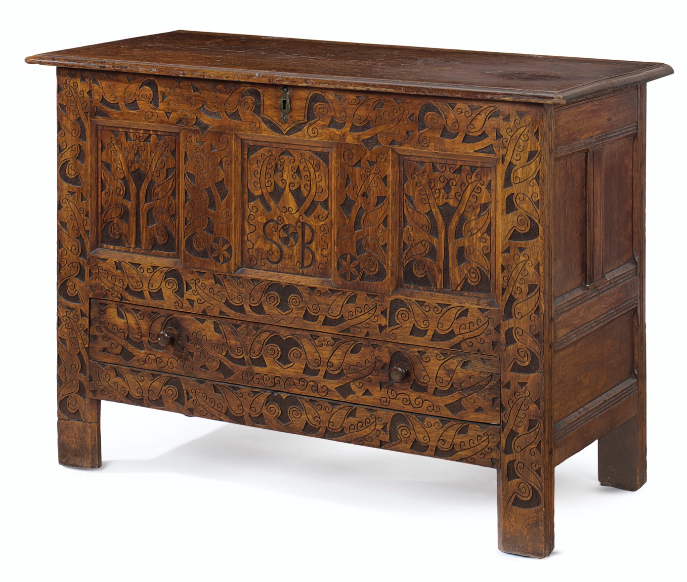 A CARVED OAK “HADLEY” CHEST WITH DRAWER