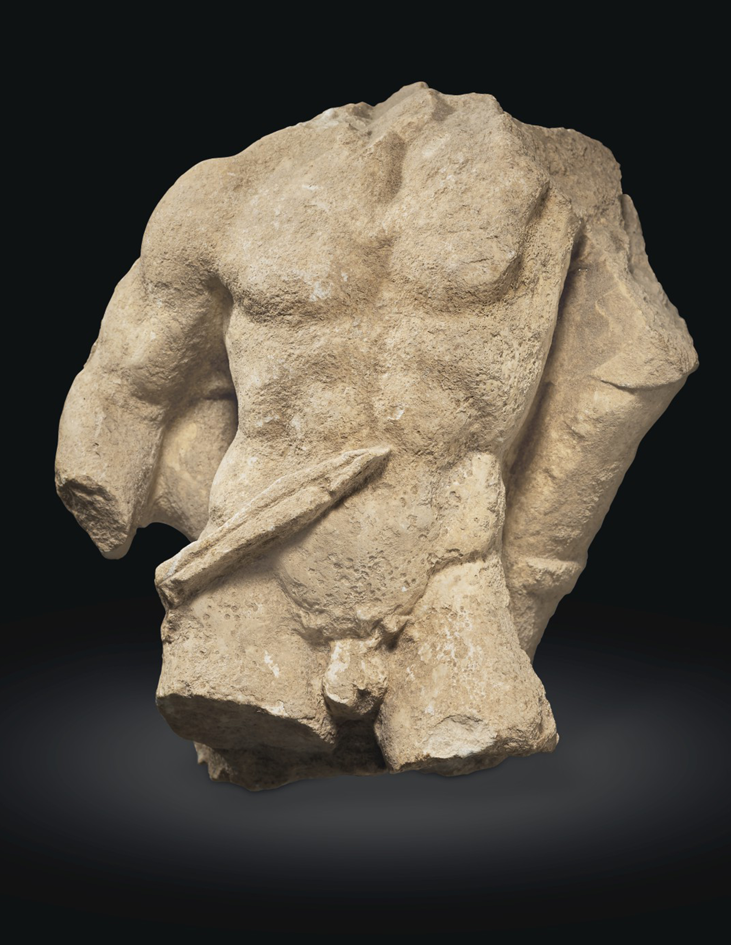 A TARANTINE LIMESTONE TORSO, LATE CLASSICAL TO EARLY HELLENISTIC PERIOD ...