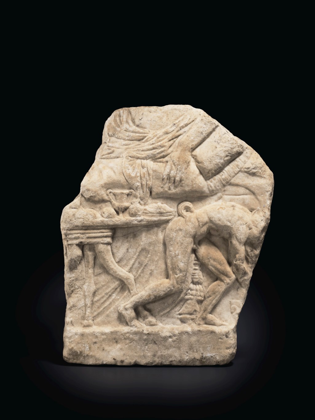 A GREEK MARBLE “ICARIUS” RELIEF, HELLENISTIC PERIOD, CIRCA 2ND-1ST ...