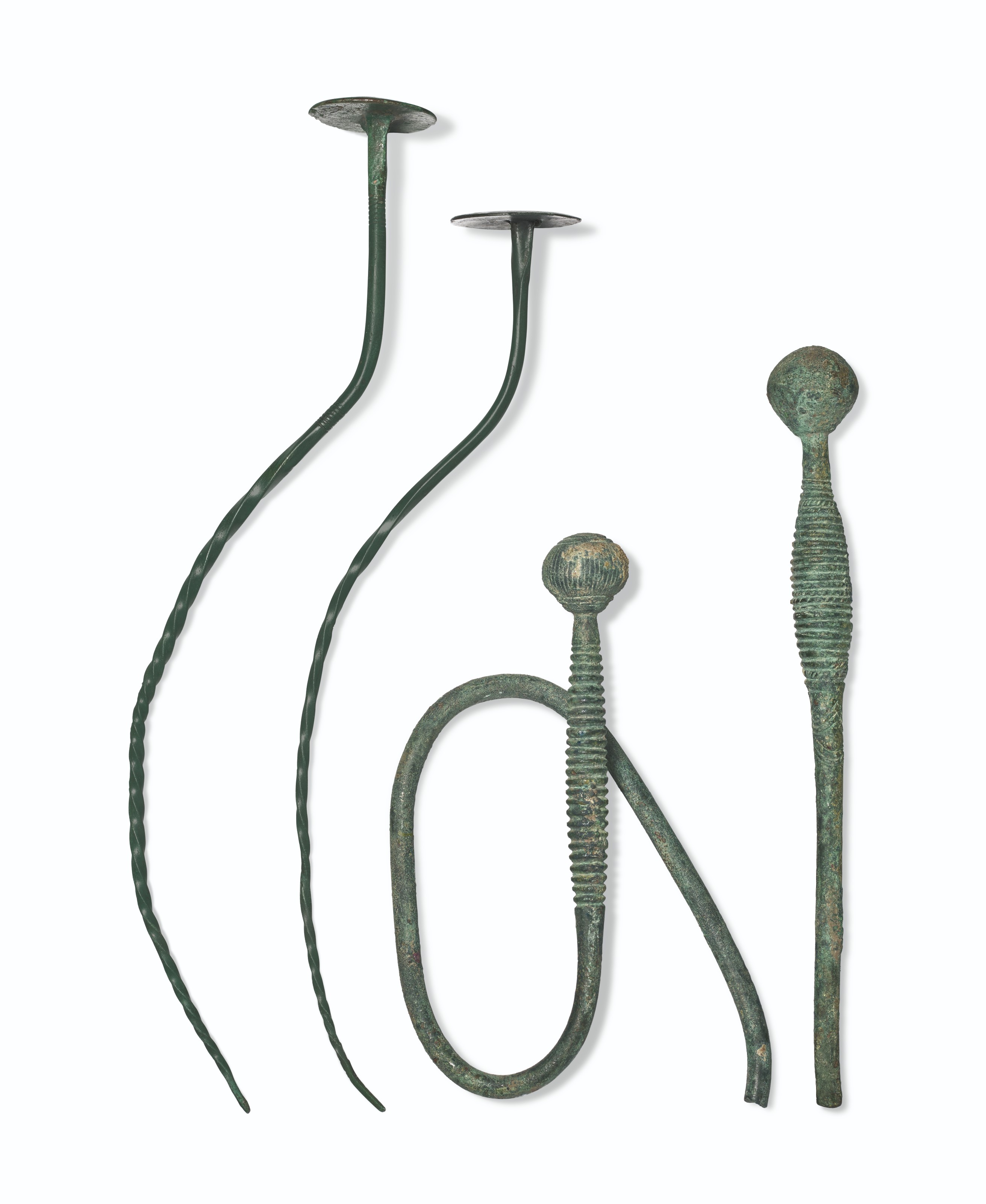 FOUR EASTERN EUROPEAN BRONZE PINS, BRONZE AGE, CIRCA 1400-1000 B.C ...