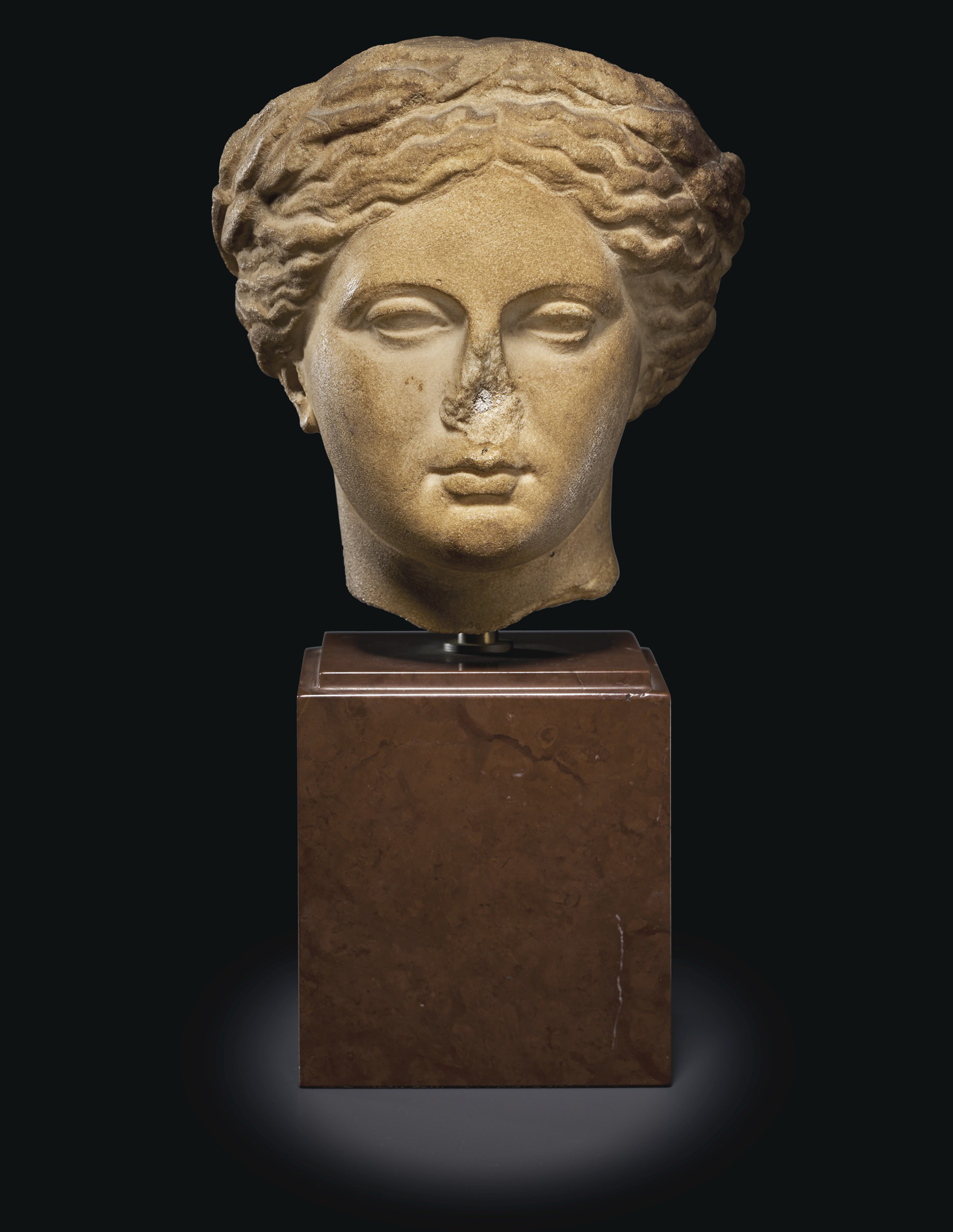 A GREEK MARBLE HEAD OF APOLLO, HELLENISTIC PERIOD, CIRCA 2ND-1ST ...