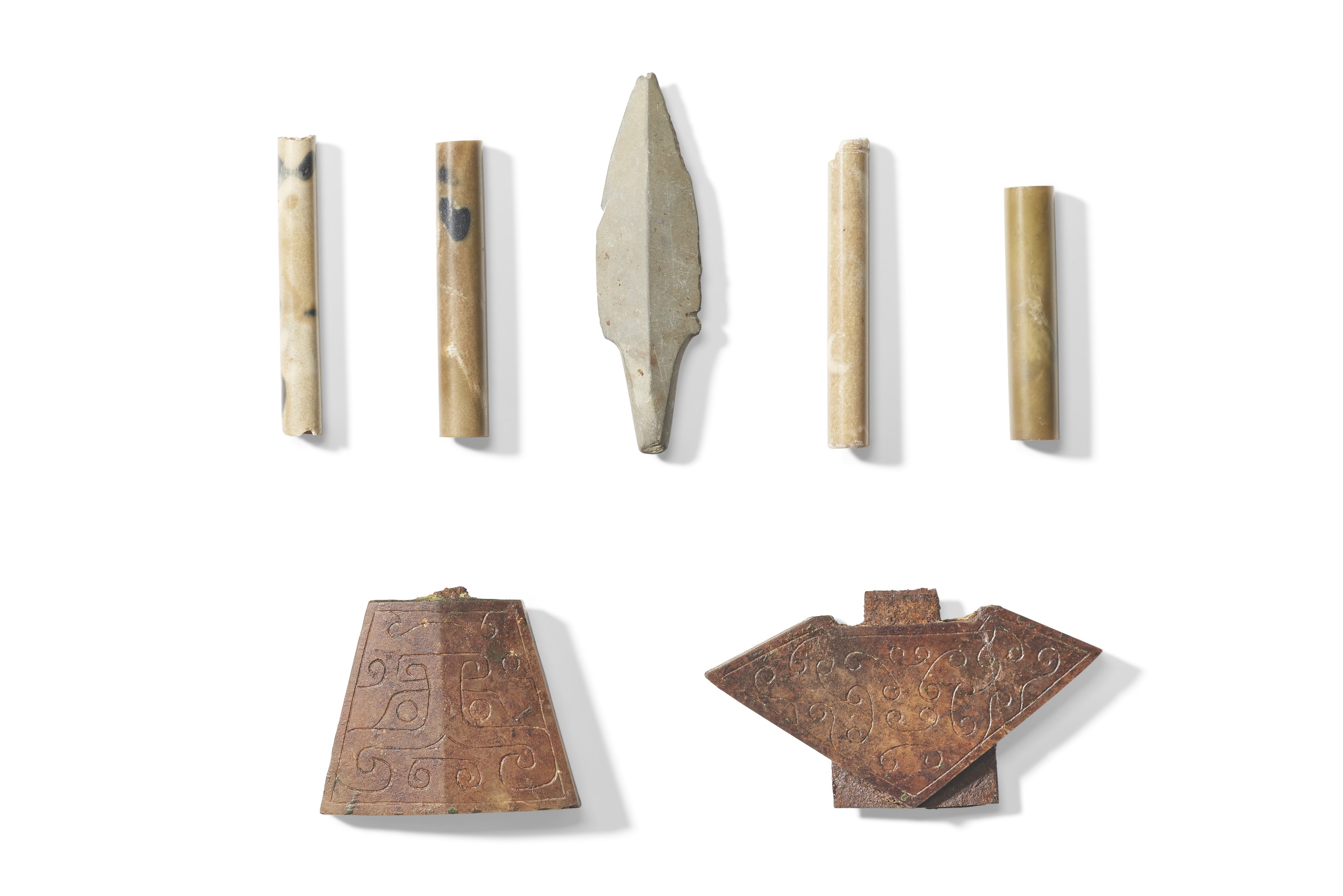 FOUR PALE BEIGE AND GREEN JADE BEADS, NORTHWEST OR SOUTHWEST CHINA, 3RD ...