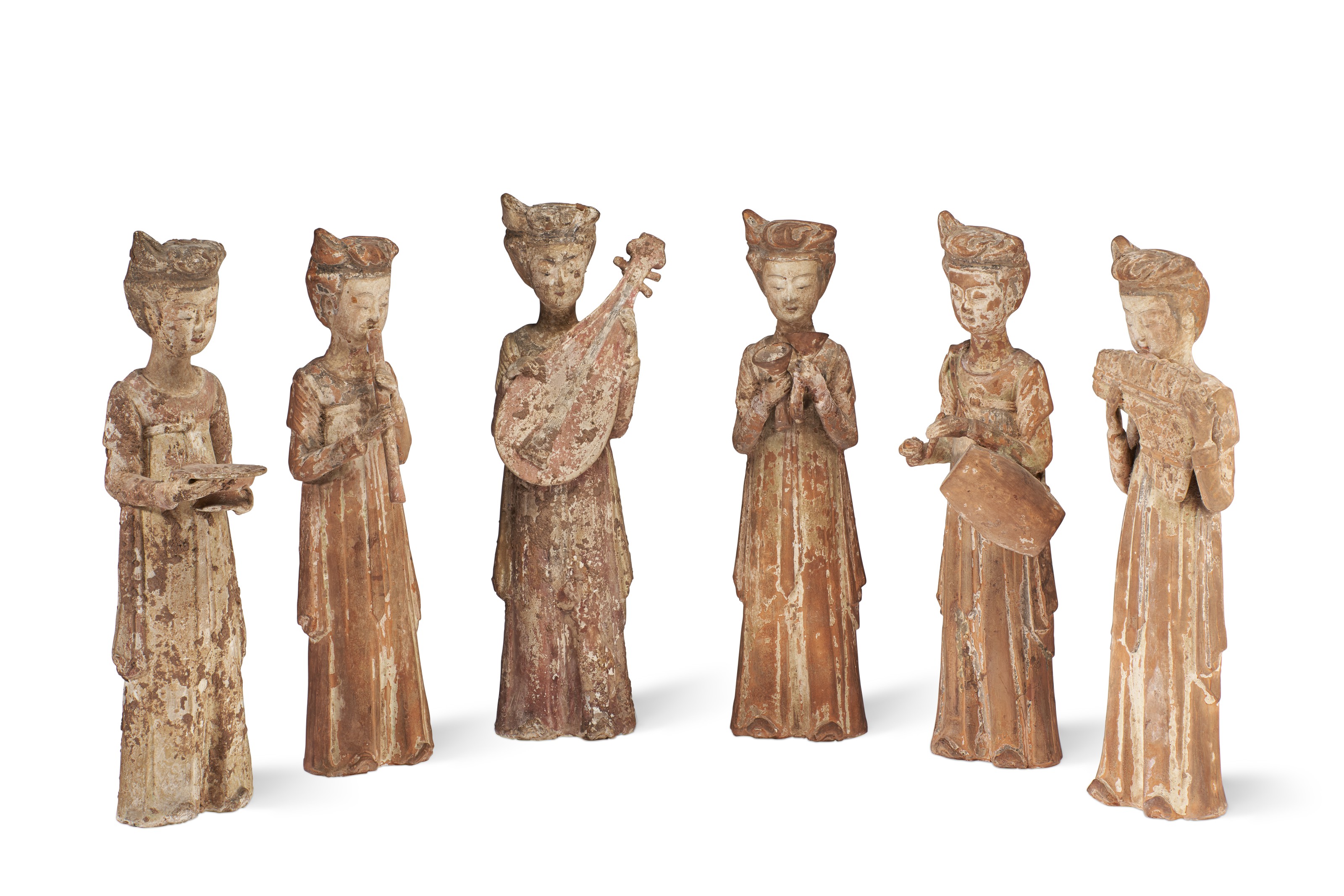 A SET OF SIX TANG-STYLE POTTERY FIGURES OF FEMALE MUSICIANS, | Christie’s