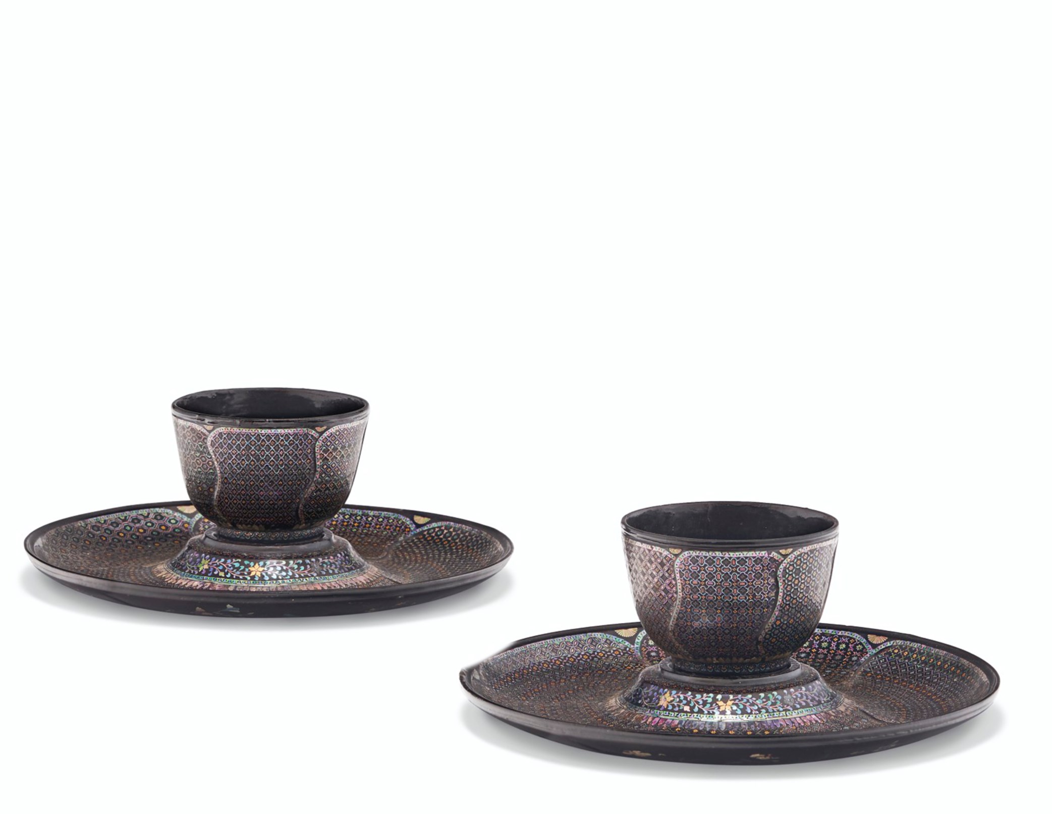 A RARE PAIR OF MOTHER-OF-PEARL-INLAID BLACK LACQUER CUPS AND SAUCERS ...