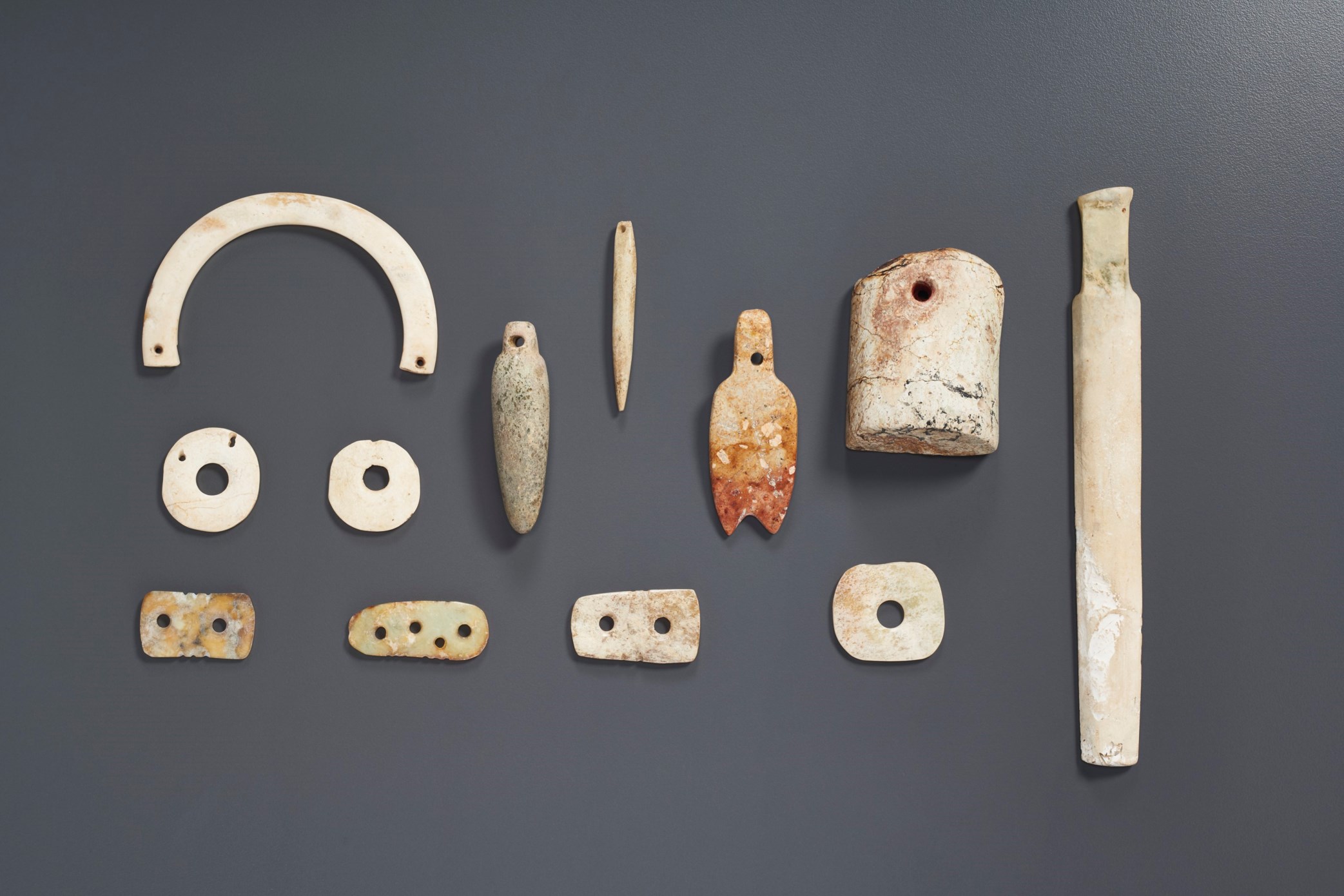 EIGHT JADE ORNAMENTS, NEOLITHIC PERIOD, LIANGZHU CULTURE, 3RD-2ND ...