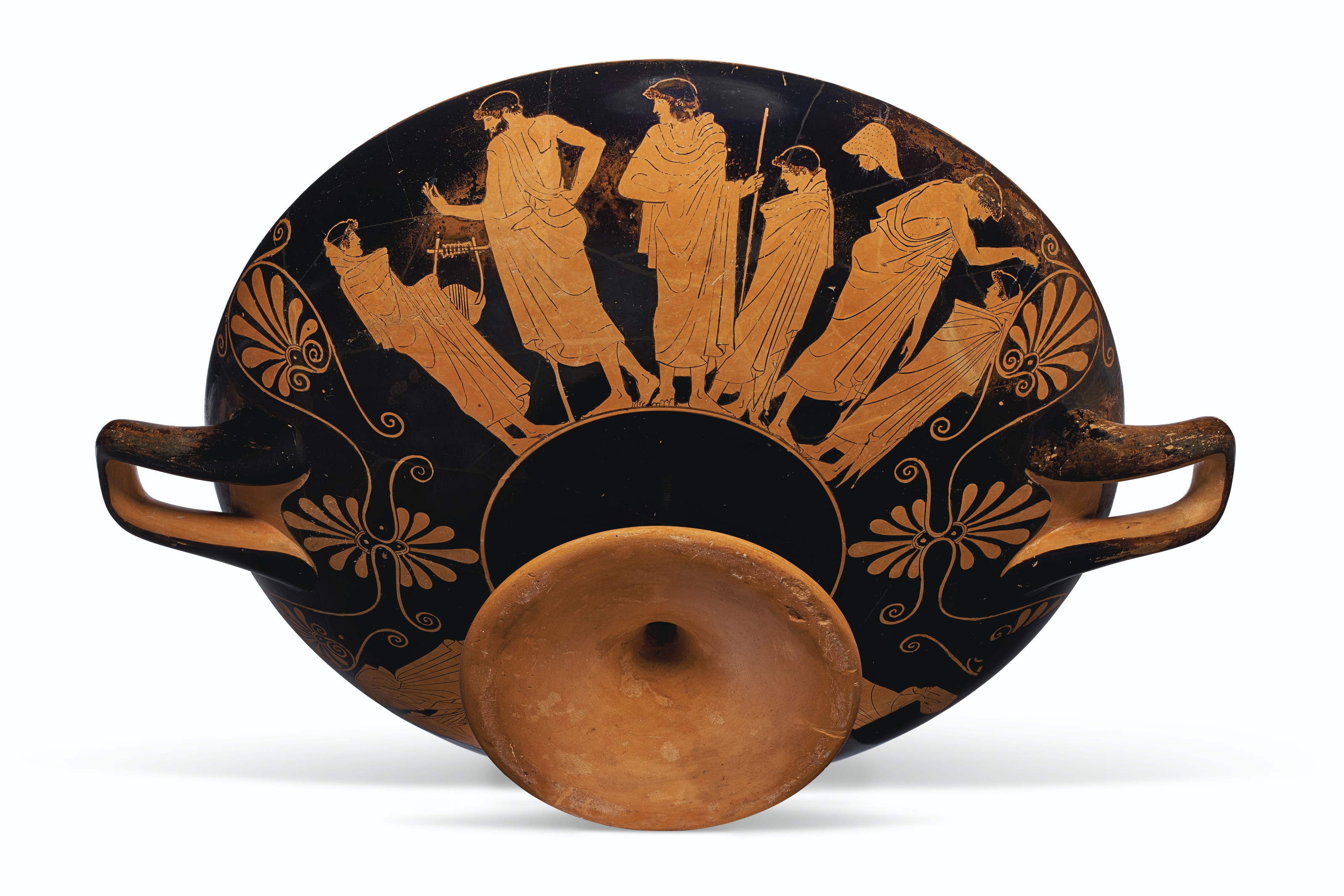 AN ATTIC RED-FIGURED KYLIX , ATTRIBUTED TO DOURIS, CIRCA 480-470 B.C ...