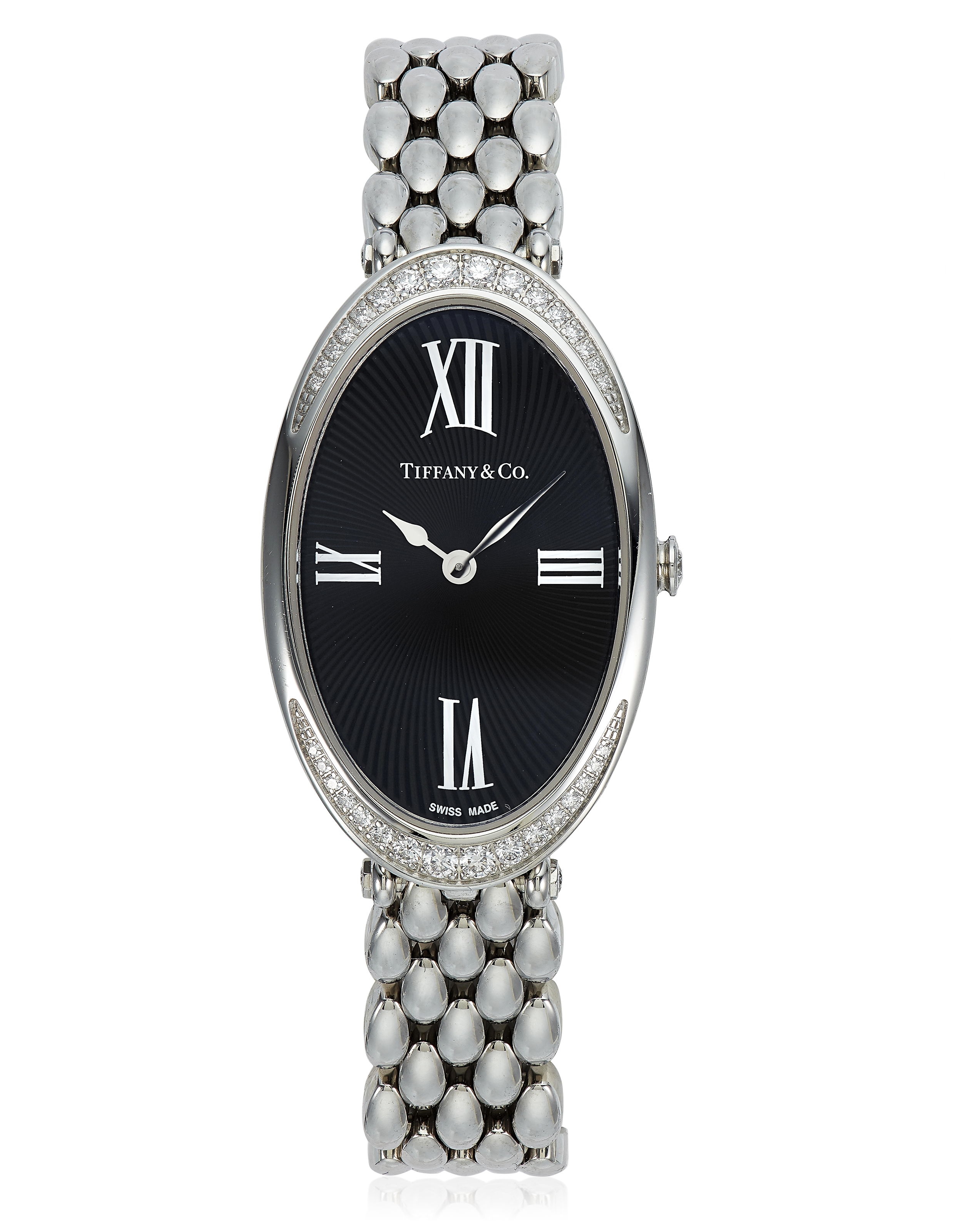 TIFFANY & CO. DIAMOND AND STEEL WATCH, | Christie’s