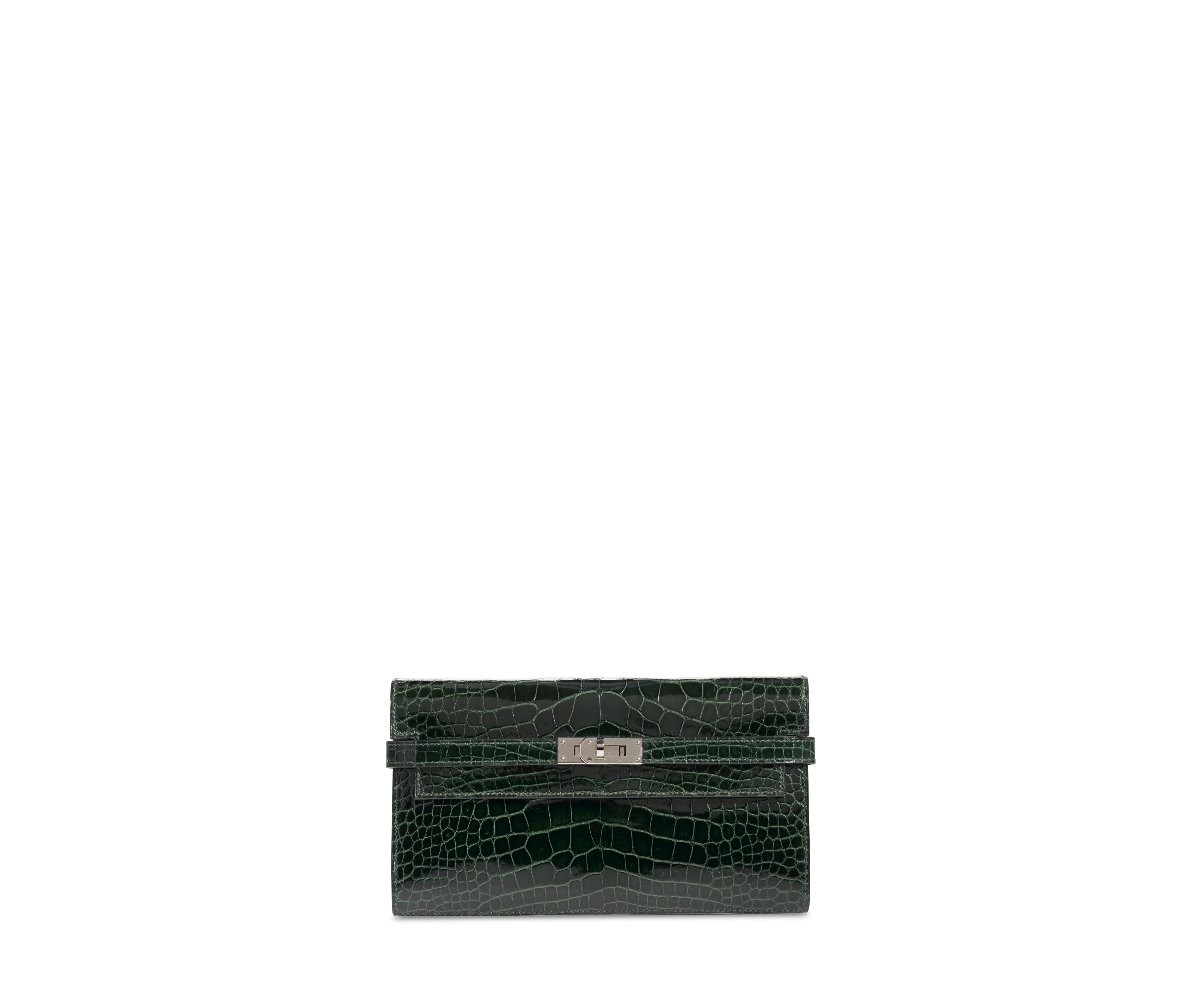 A SHINY VERT FONCÉ ALLIGATOR KELLY CLASSIC WALLET WITH PALLADIUM ...