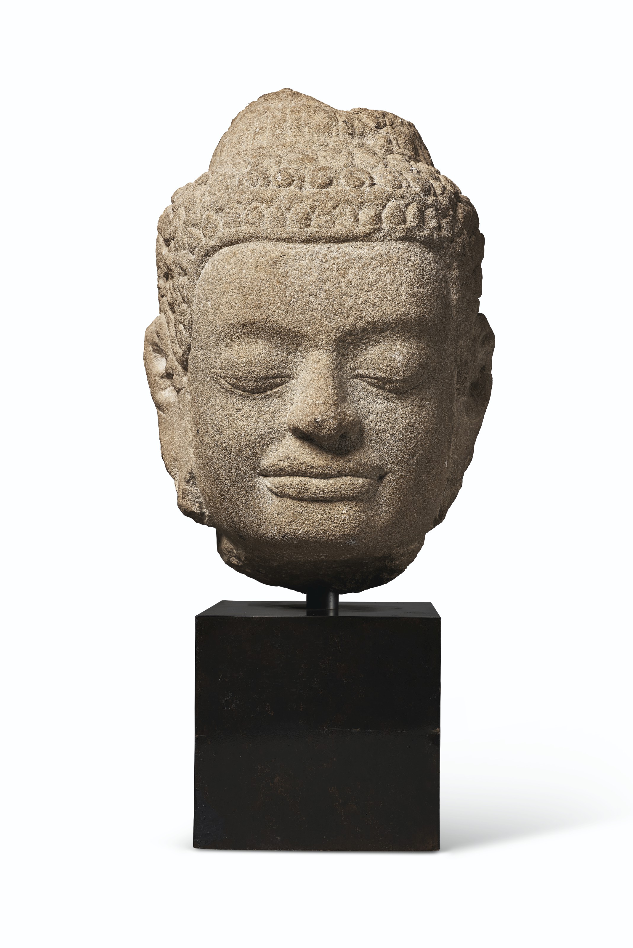 A BUFF SANDSTONE HEAD OF BUDDHA, THAILAND, LOPBURI PERIOD, 12TH-13TH ...