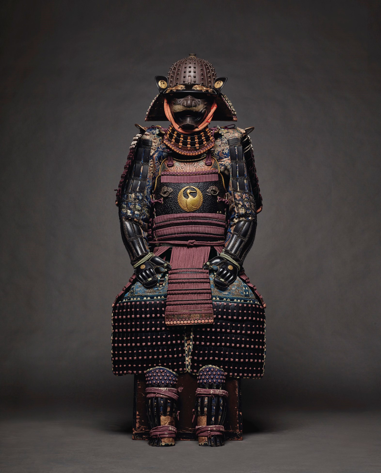 A PURPLE LACED DANGAE-DO ARMOR WITH A MYOCHIN HELMET AND FACEMASK