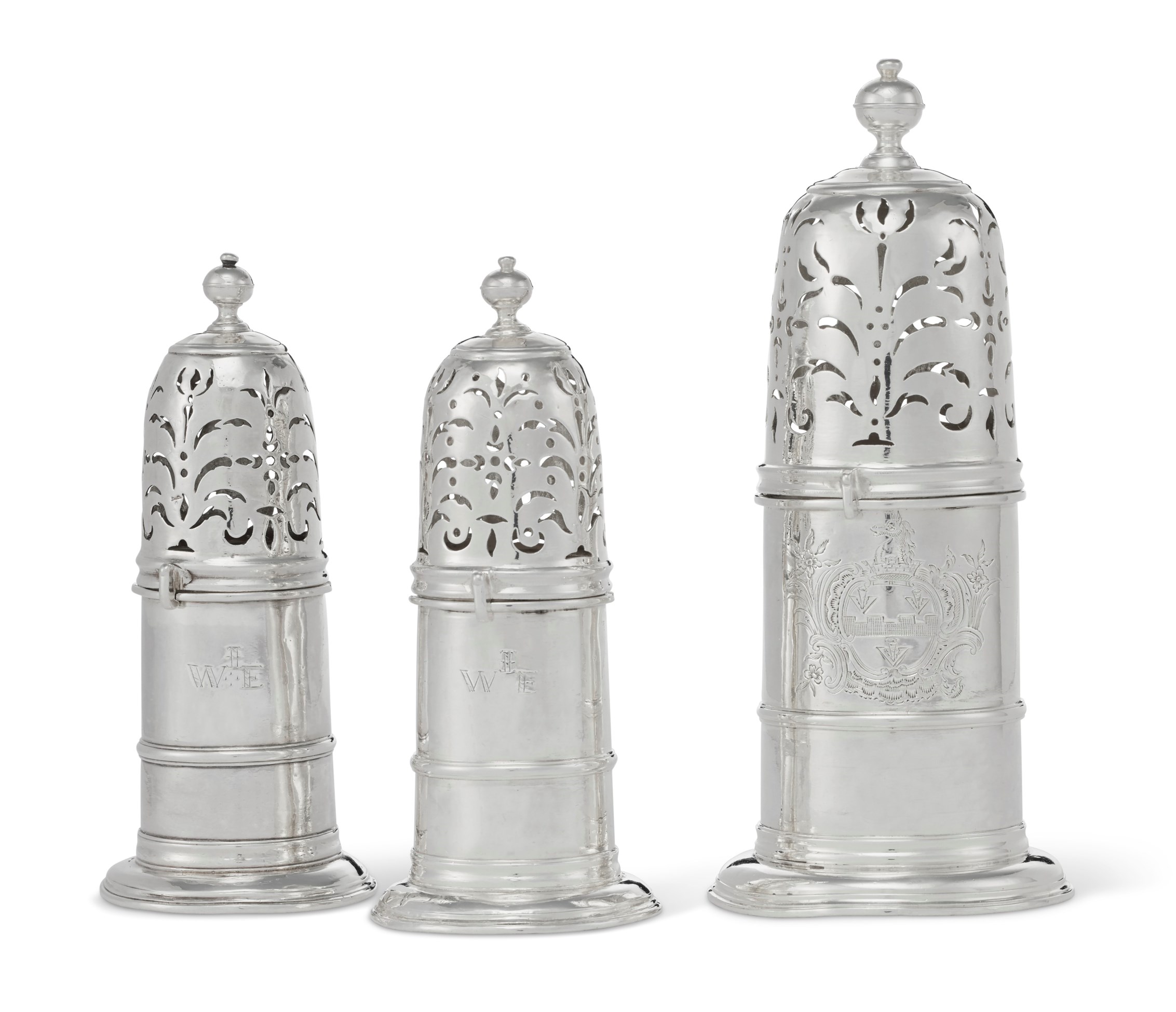 A SET OF THREE QUEEN ANNE SILVER CASTERS, MARK OF CHARLES ADAM, LONDON ...