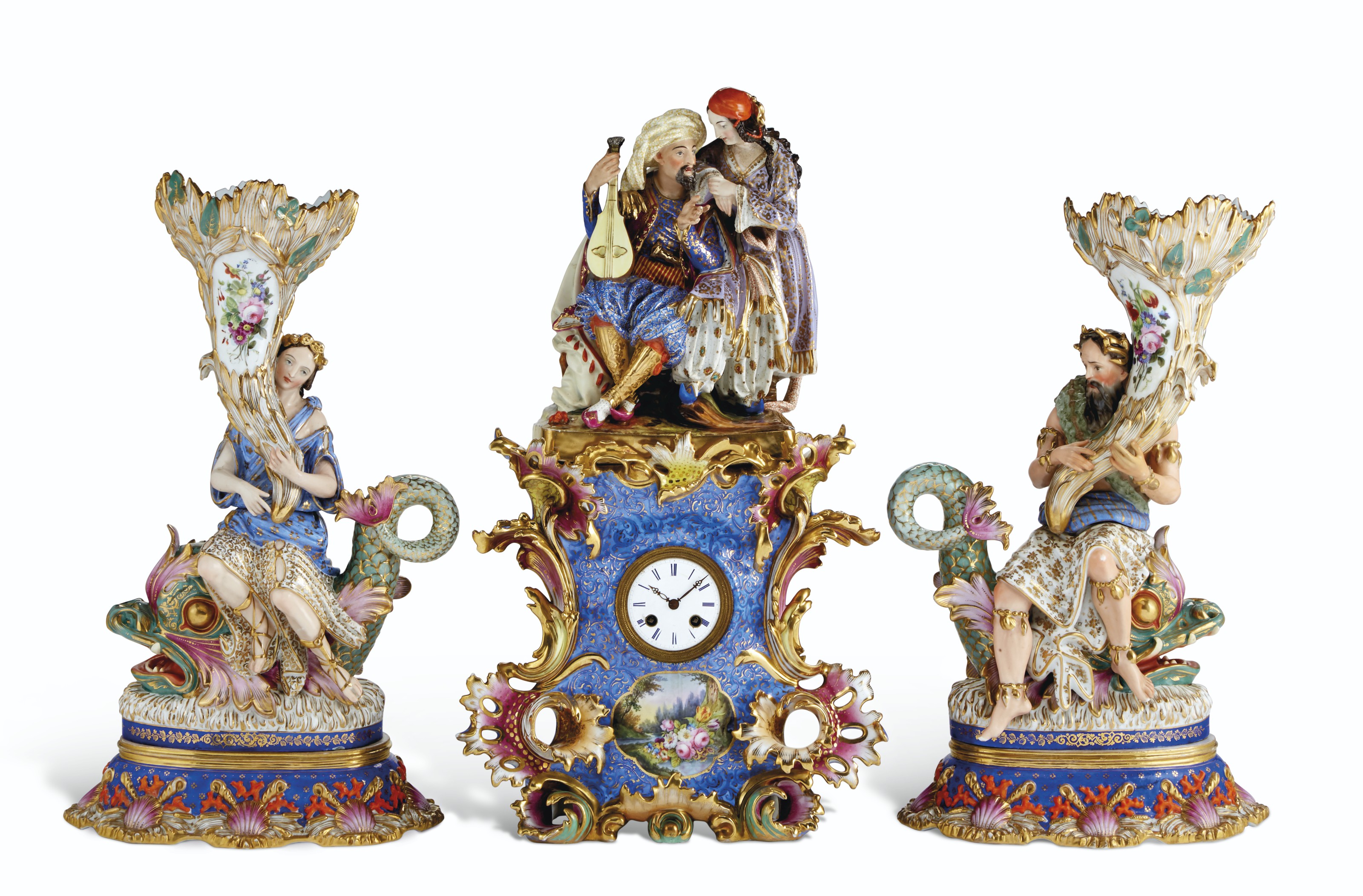 AN ASSEMBLED FRENCH PORCELAIN THREE-PIECE CLOCK GARNITURE, MID-19TH ...