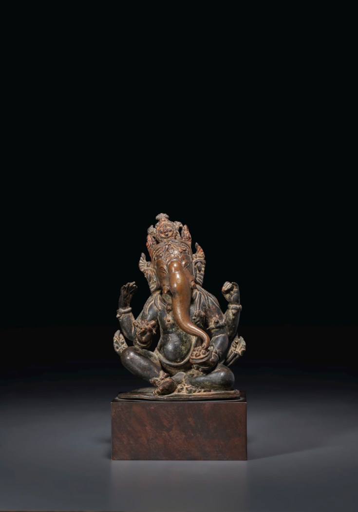 A RARE BRONZE FIGURE OF GANESHA