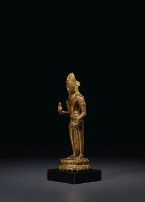 A RARE GILT-BRONZE FIGURE OF VAJRAPANI, NEPAL, LICCHAVI PERIOD, 9TH ...