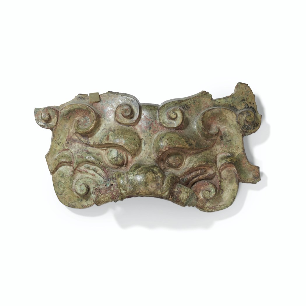 A BRONZE TAOTIE MASK-FORM FITTING, CHINA, WARRING STATES PERIOD-HAN ...