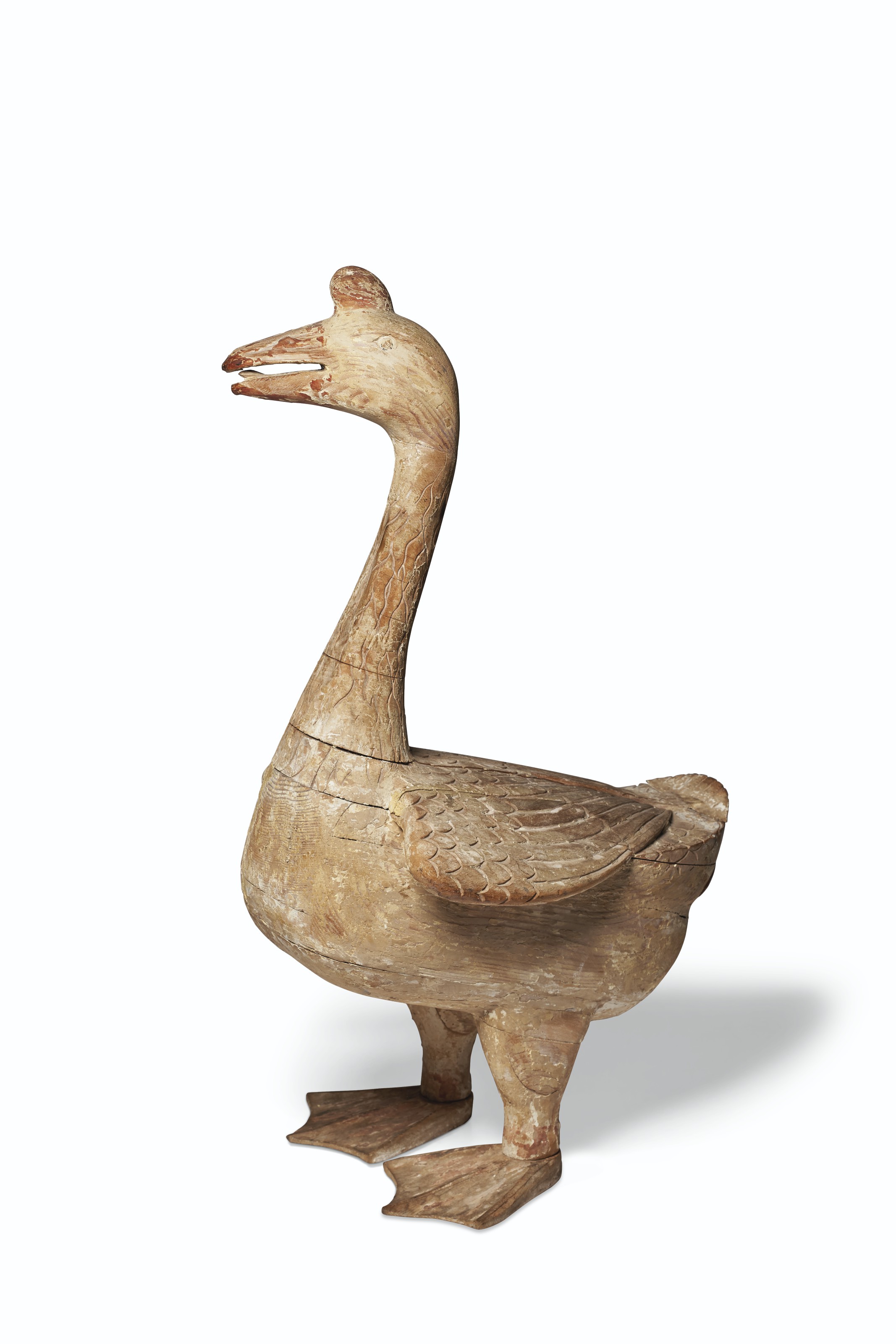 A LARGE WOOD FIGURE OF A GOOSE