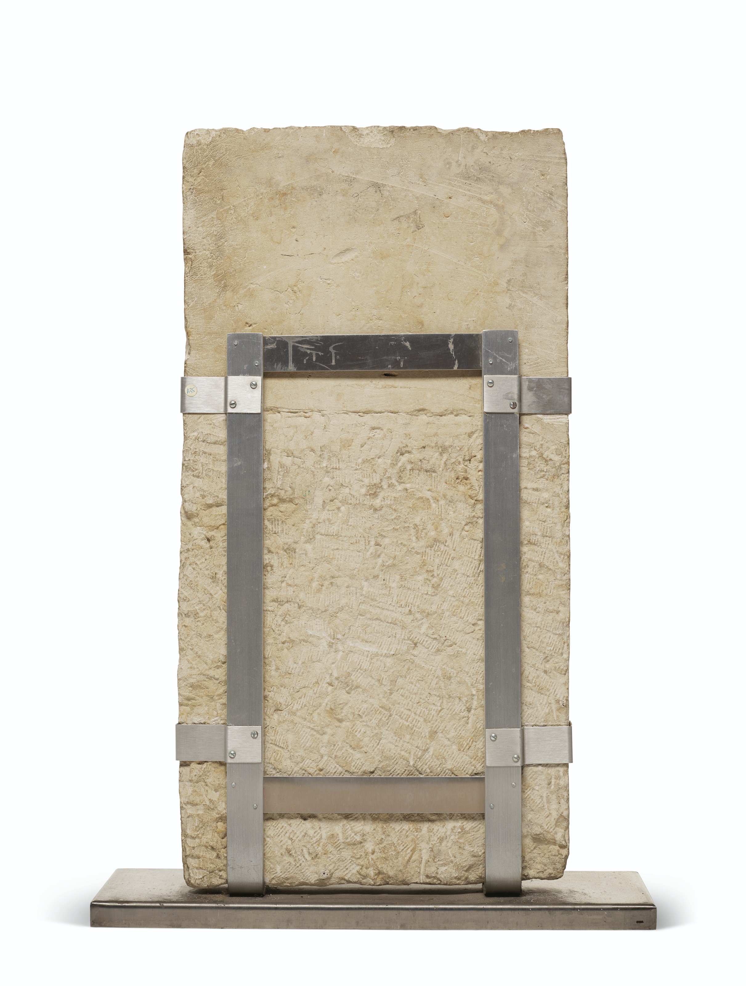 A CARVED WHITE LIMESTONE TOMBSTONE