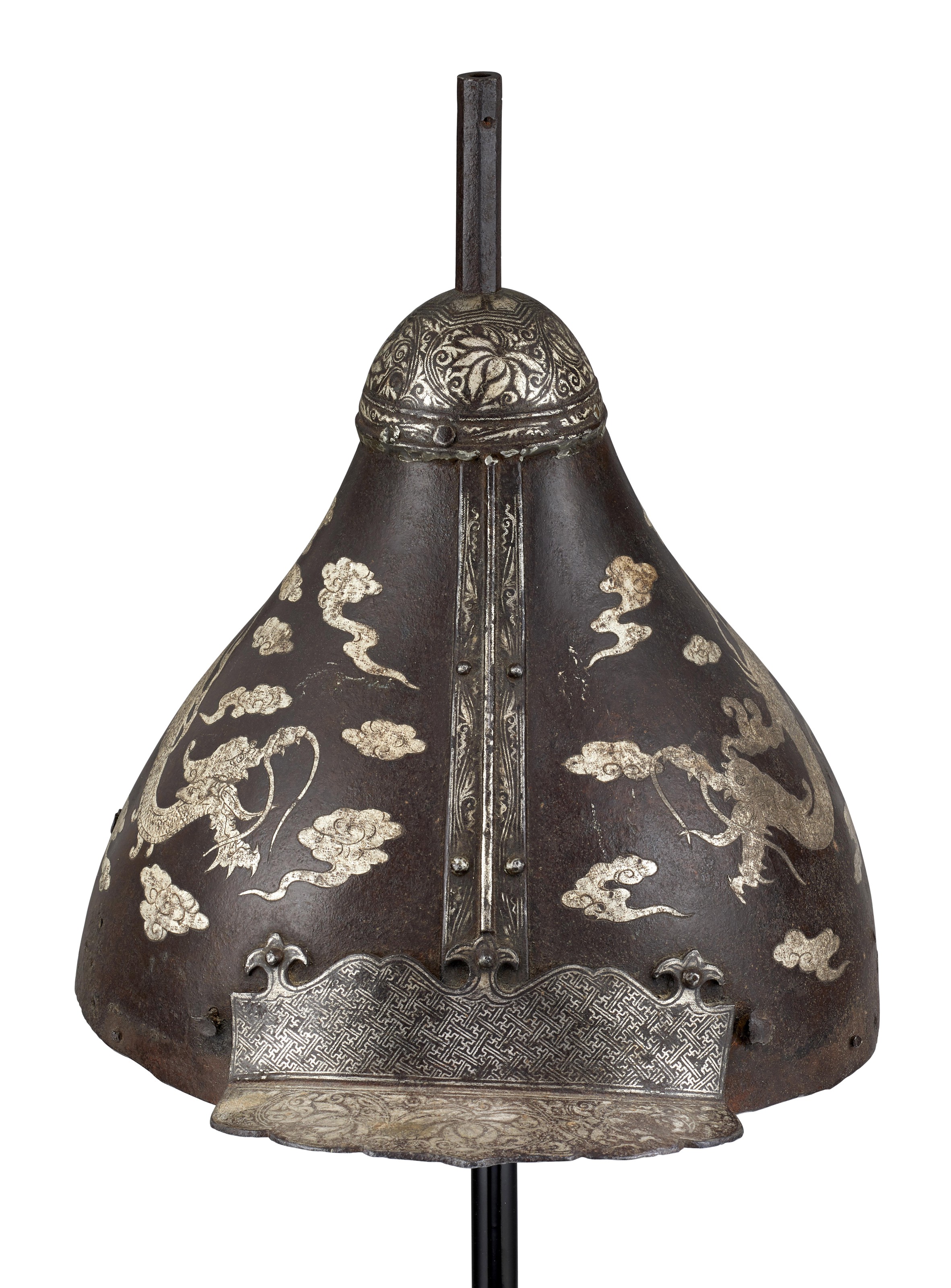 A SILVER-DAMASCENED IRON HELMET, TIBET OR MONGOLIA, 17TH-18TH CENTURY ...