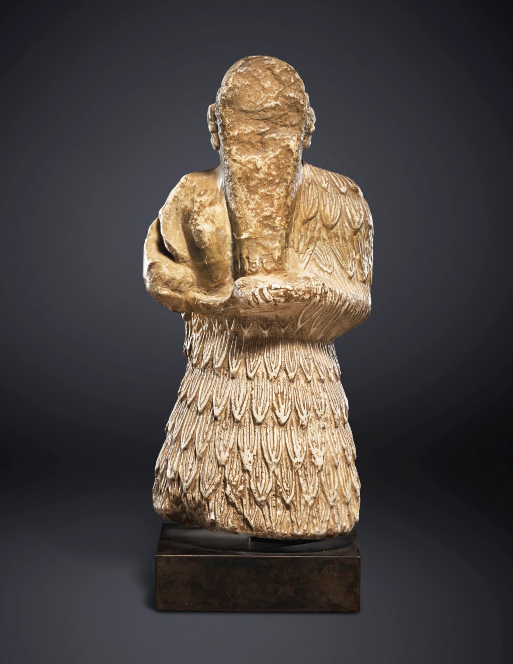 A SUMERIAN LIMESTONE STANDING MALE FIGURE, EARLY DYNASTIC IIIB, CIRCA ...