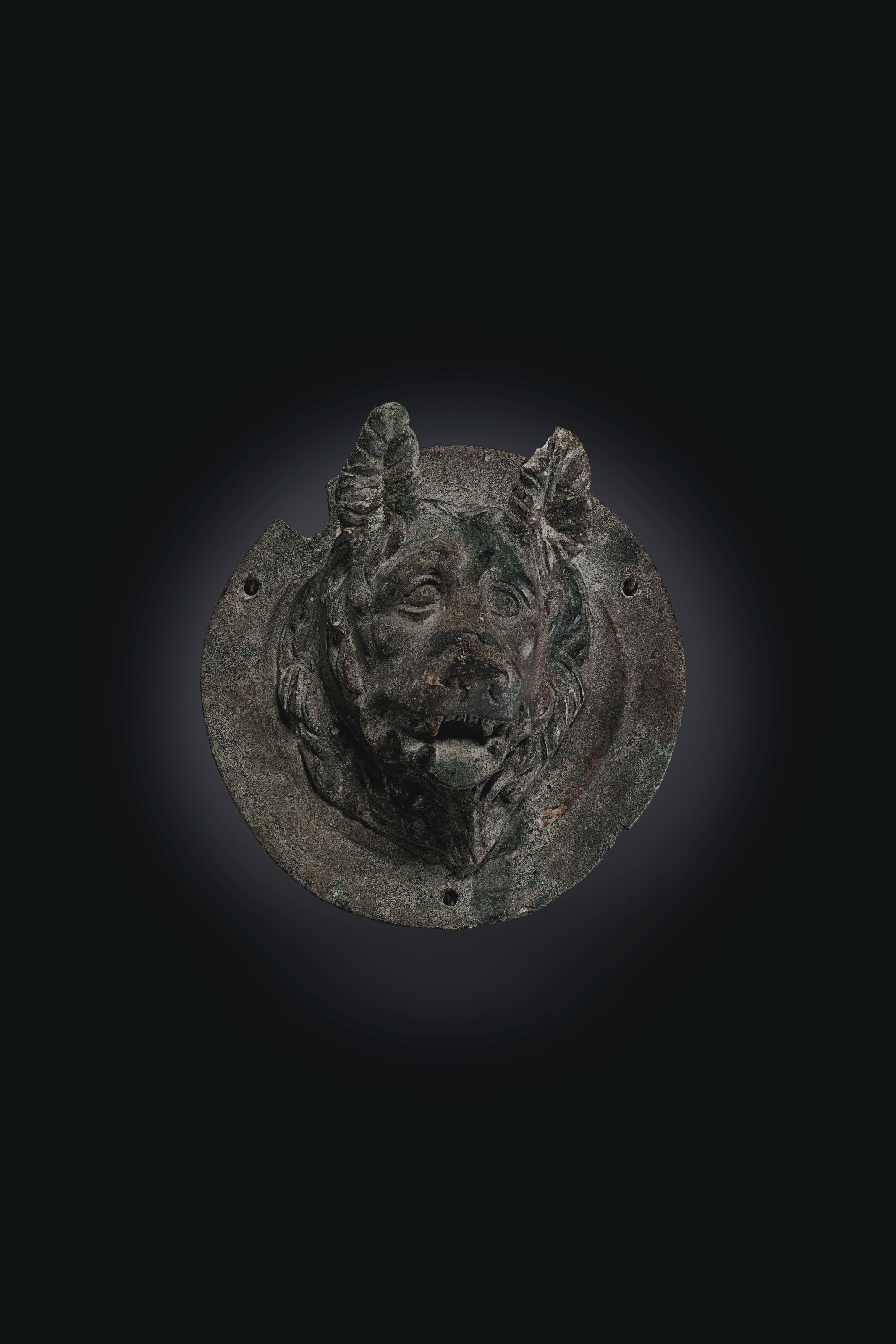 A ROMAN BRONZE ROUNDEL WITH A MOLOSSIAN HOUND, CIRCA 1ST-2ND CENTURY A ...