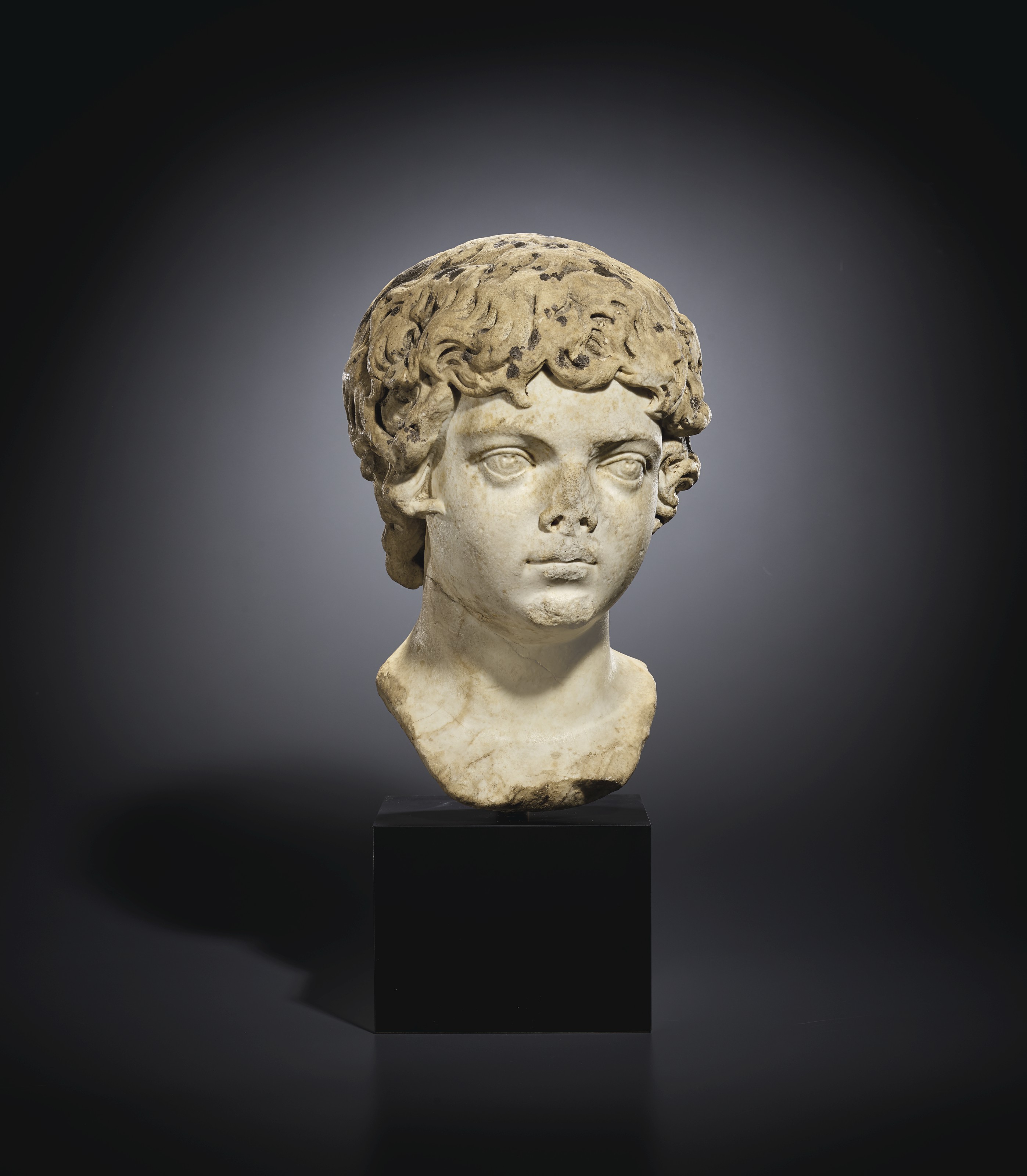 A ROMAN MARBLE PORTRAIT BUST OF THE YOUNG CARACALLA, SEVERAN PERIOD ...